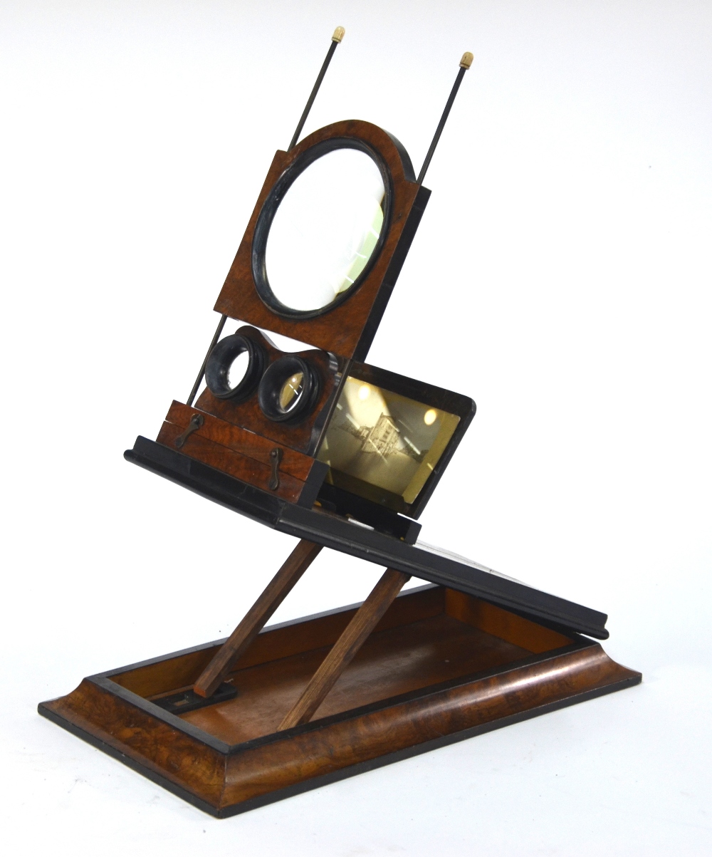 A Victorian stereo graphoscope of typical rectangular and folding form ...