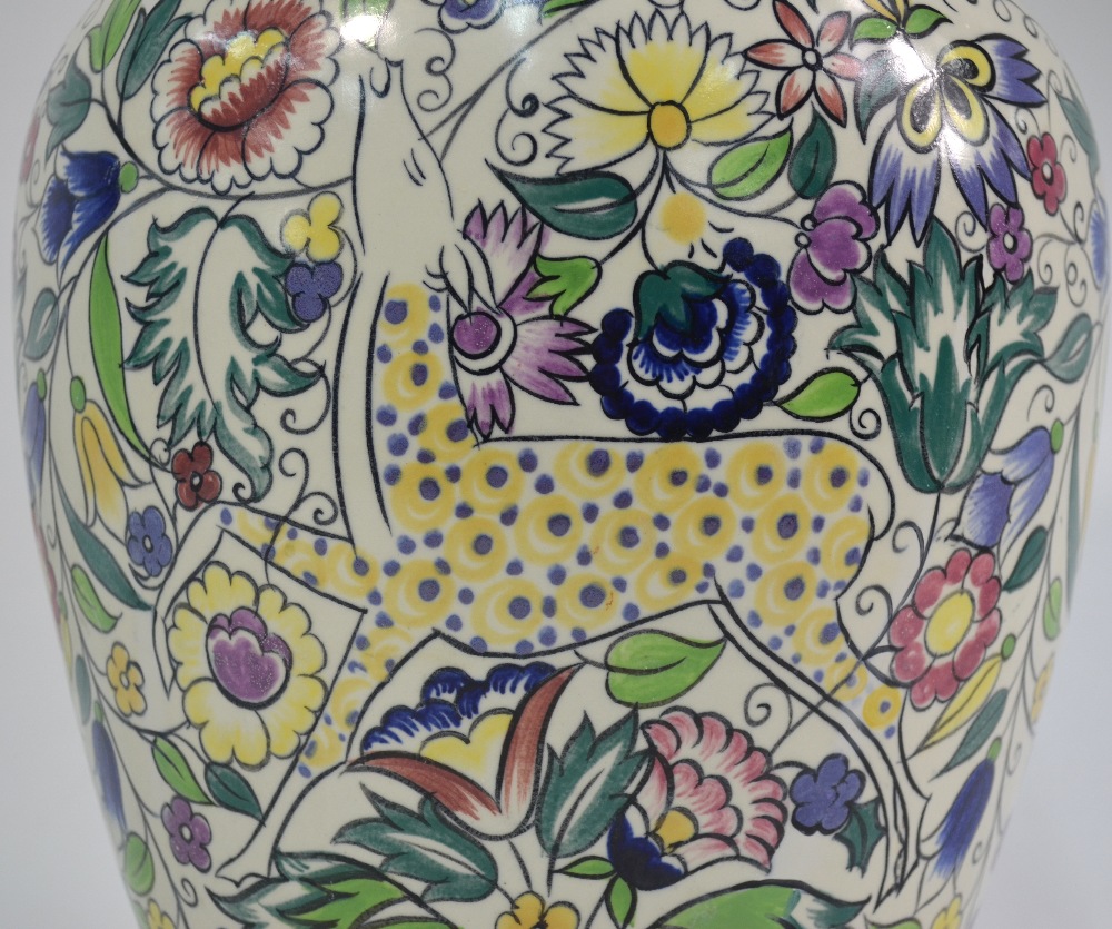 A large Poole Pottery vase decorated with the Persian deer design ...