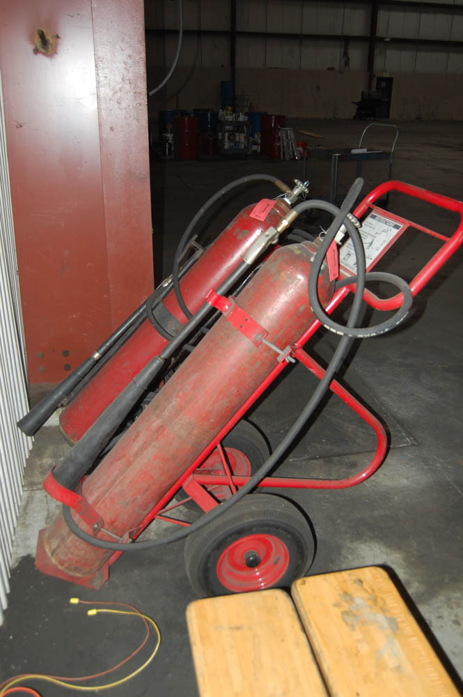 FIRE EXTINGUISHER CAGE WITH APPROX. 12 FIRE EXTINGUISHERS, (2 ...