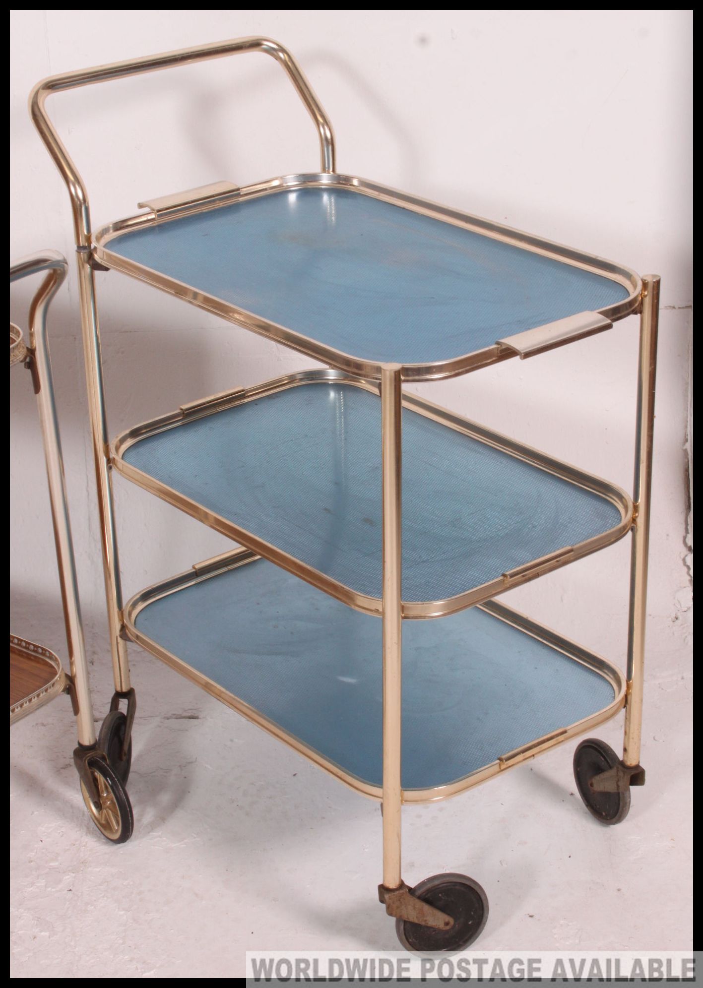 2 vintage mid century retro hostess trolleys, one in blue, the other ...
