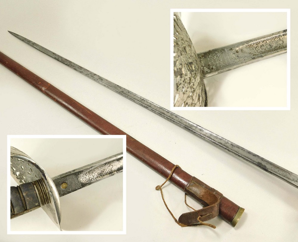 EDWARD VIII SWORD. A British infantry officers sword & scabbard with ...
