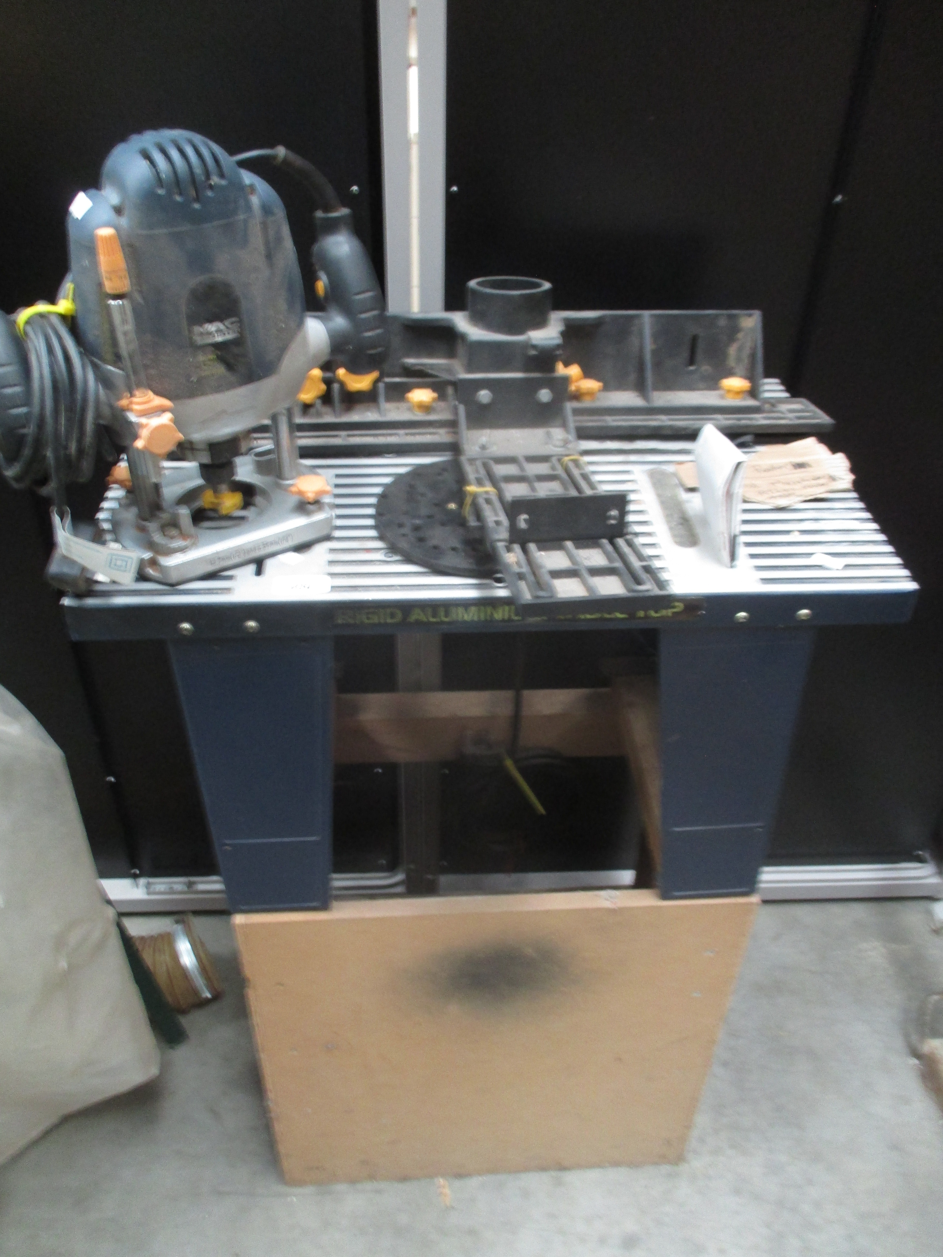 A MacAllister COD1200R 240v router with rigid aluminium top router table