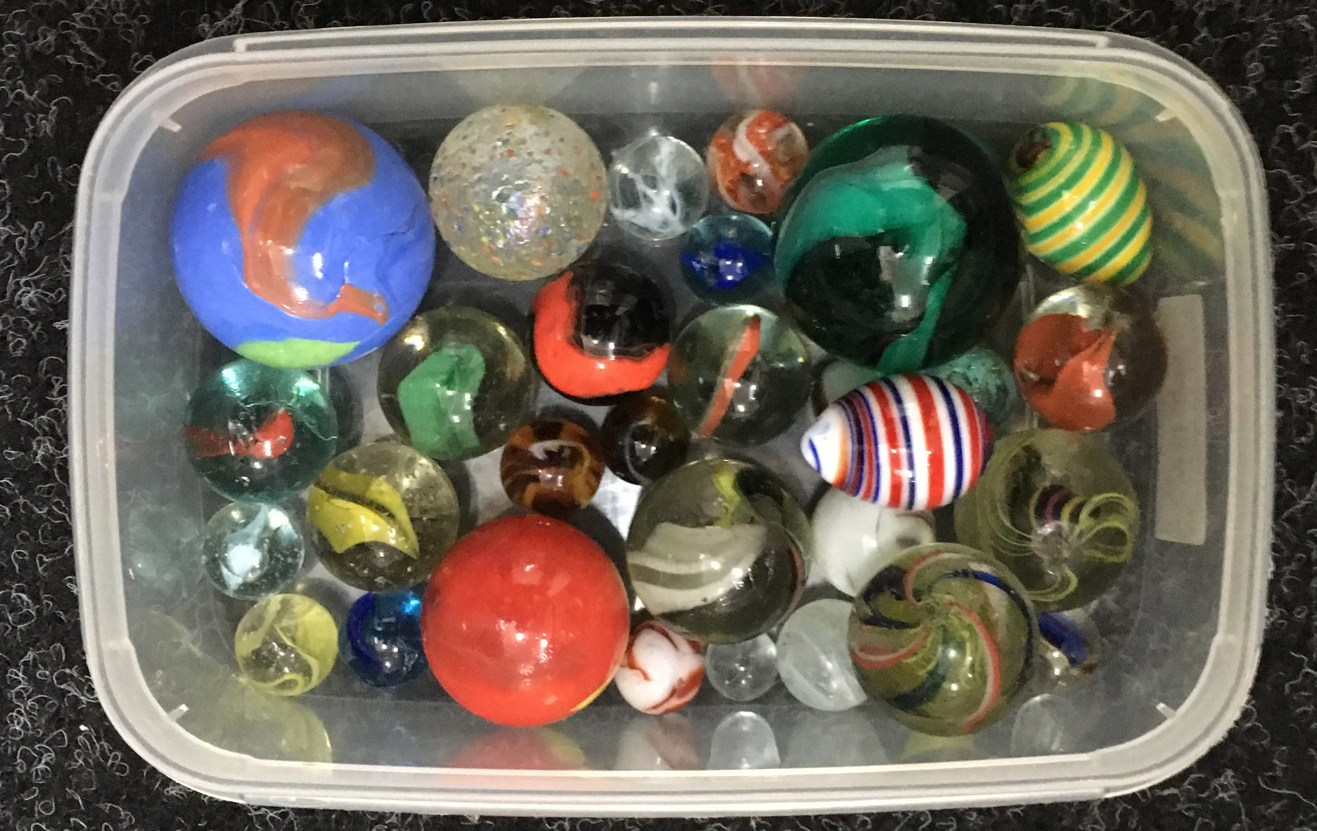 A small collection of marbles inc some with pontil marks [NO RESERVE]