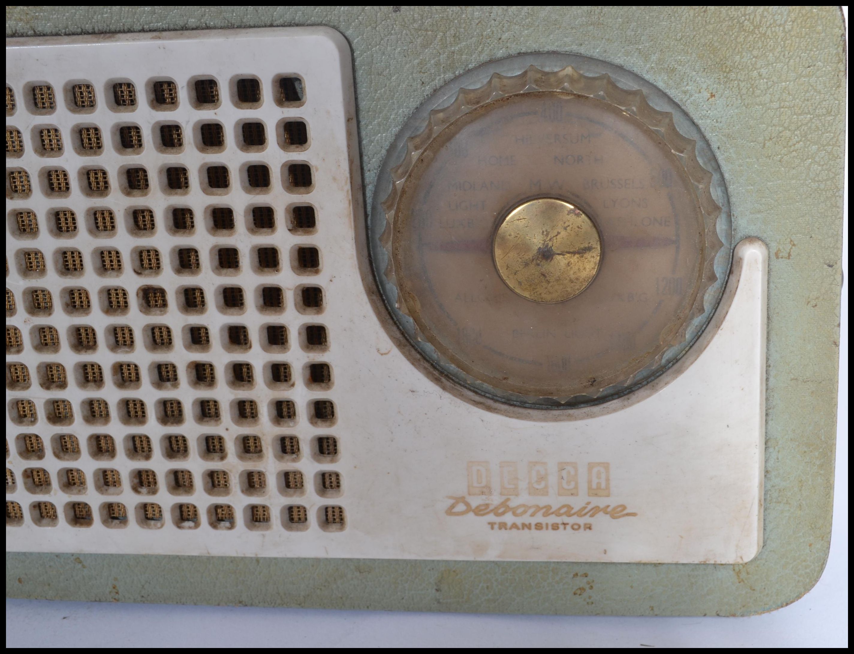 A vintage mid 20th century transistor radio by Decca together with ...