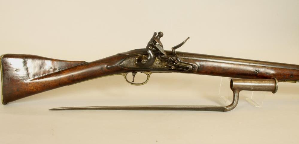 A GEORGIAN BROWN BESS FLINTLOCK TOWER MUSKET, the 39" barrel with front ...