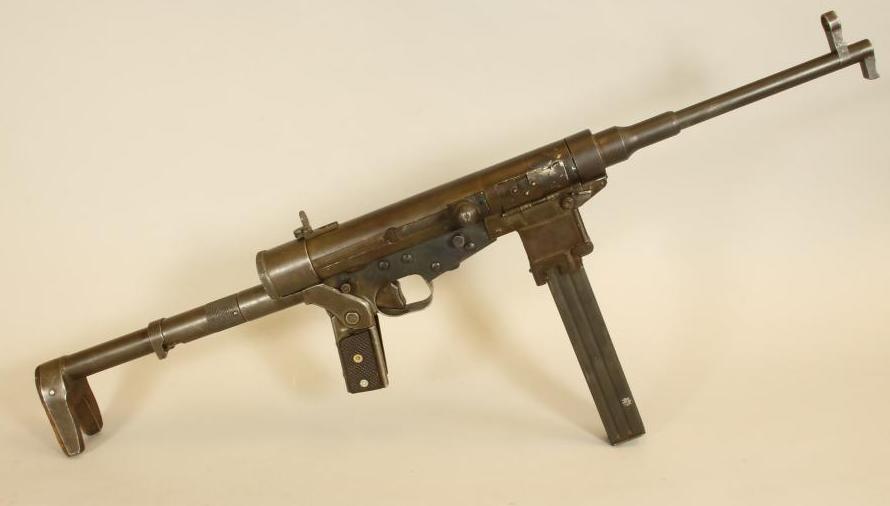 A DEACTIVATED HOTCHKISS UNIVERSAL FOLDING SUBMACHINE GUN, with front ...