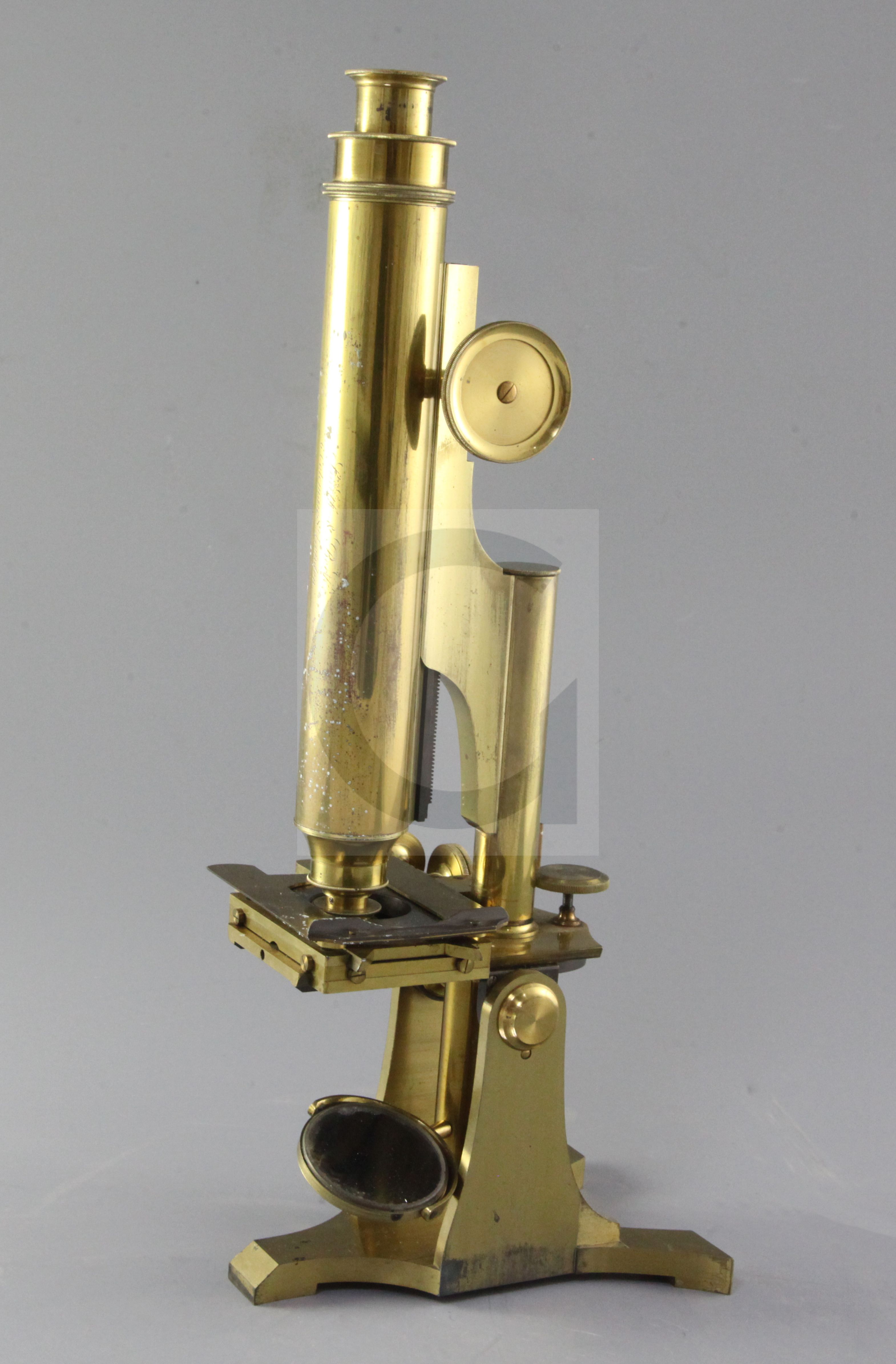A late 19th century lacquered brass Smith and Beck monocular microscope ...