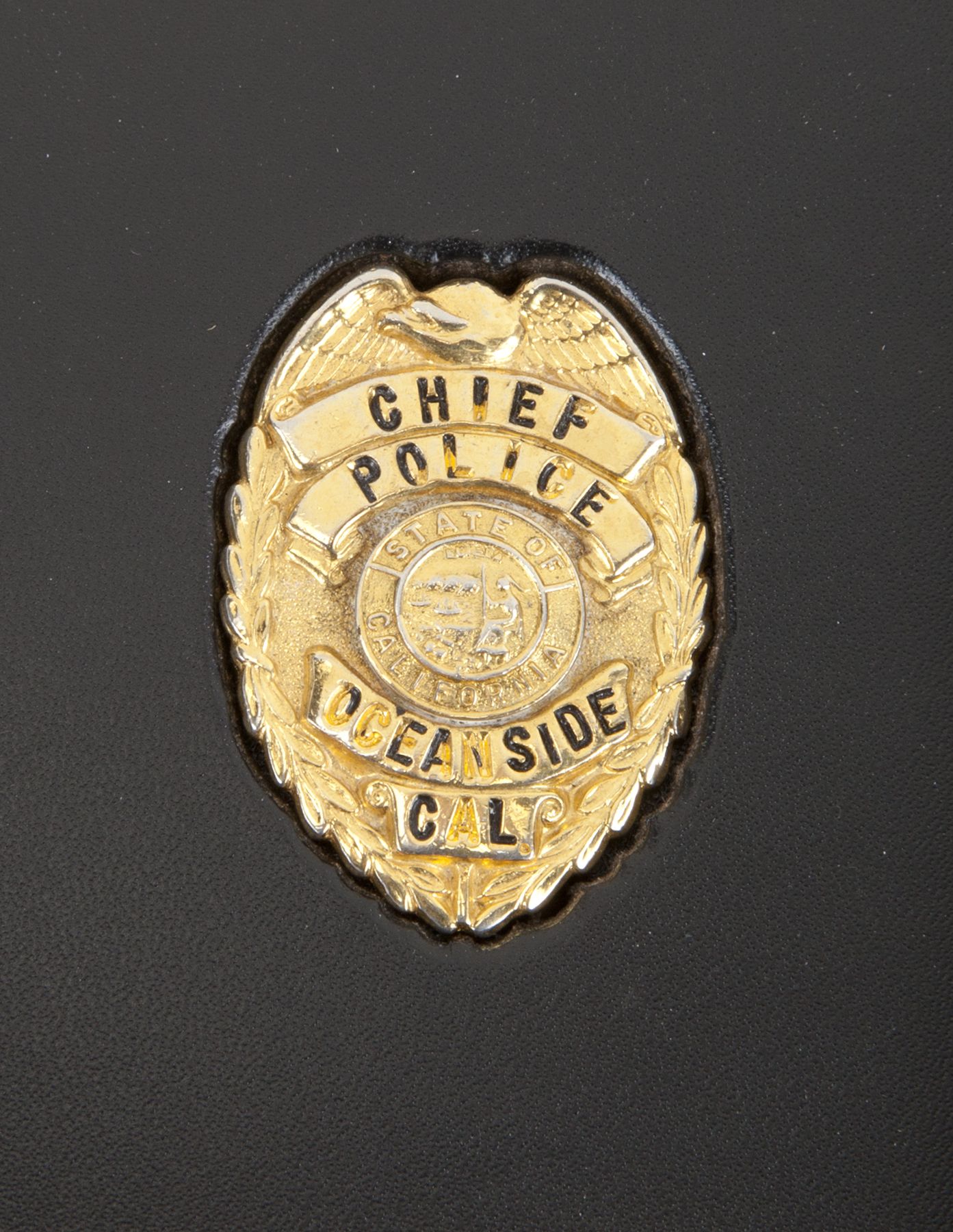An Elvis Presley Oceanside, California, Chief of Police badge contained ...
