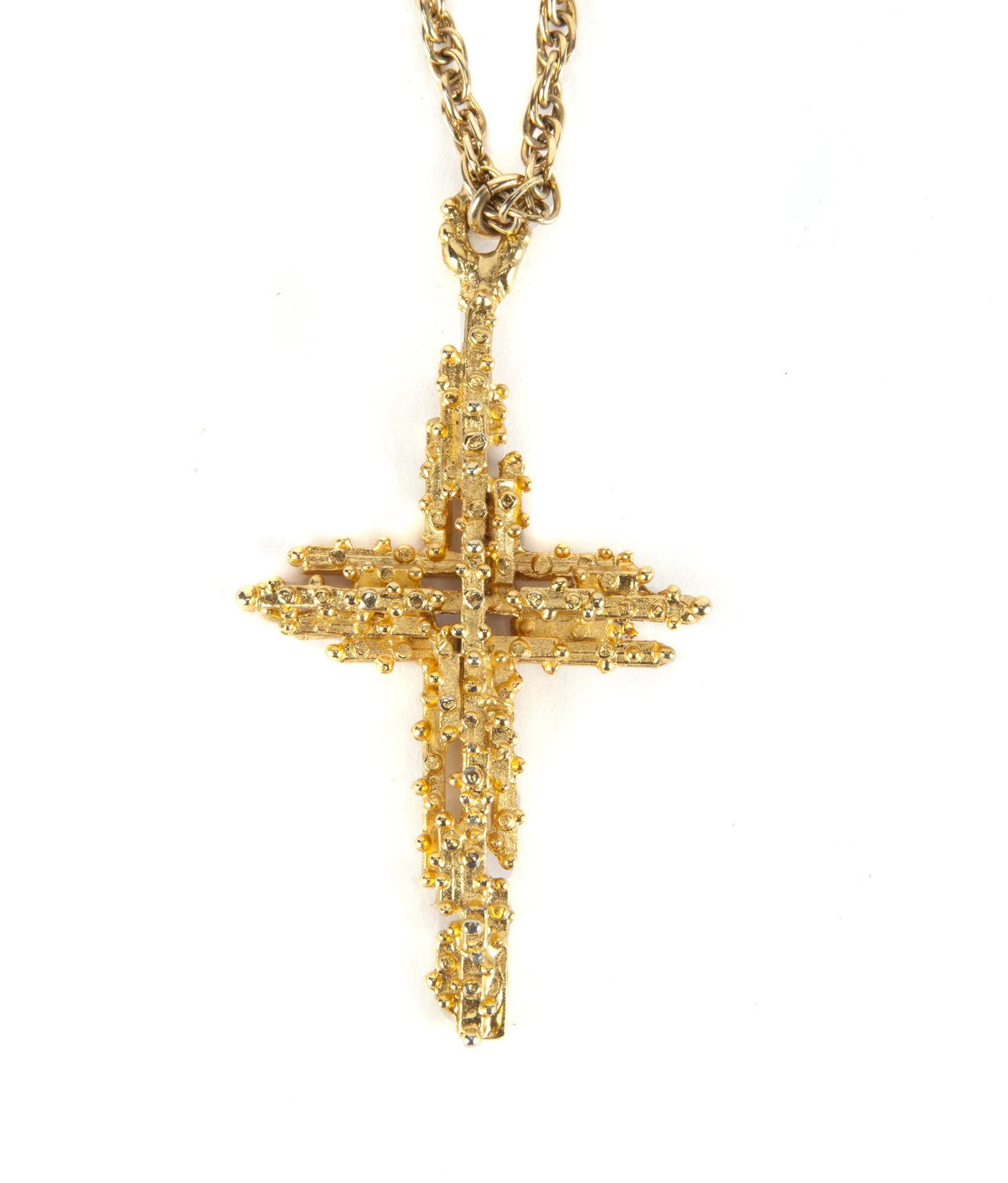An Elvis Presley gold tone cross pendant necklace given to Memphis ...