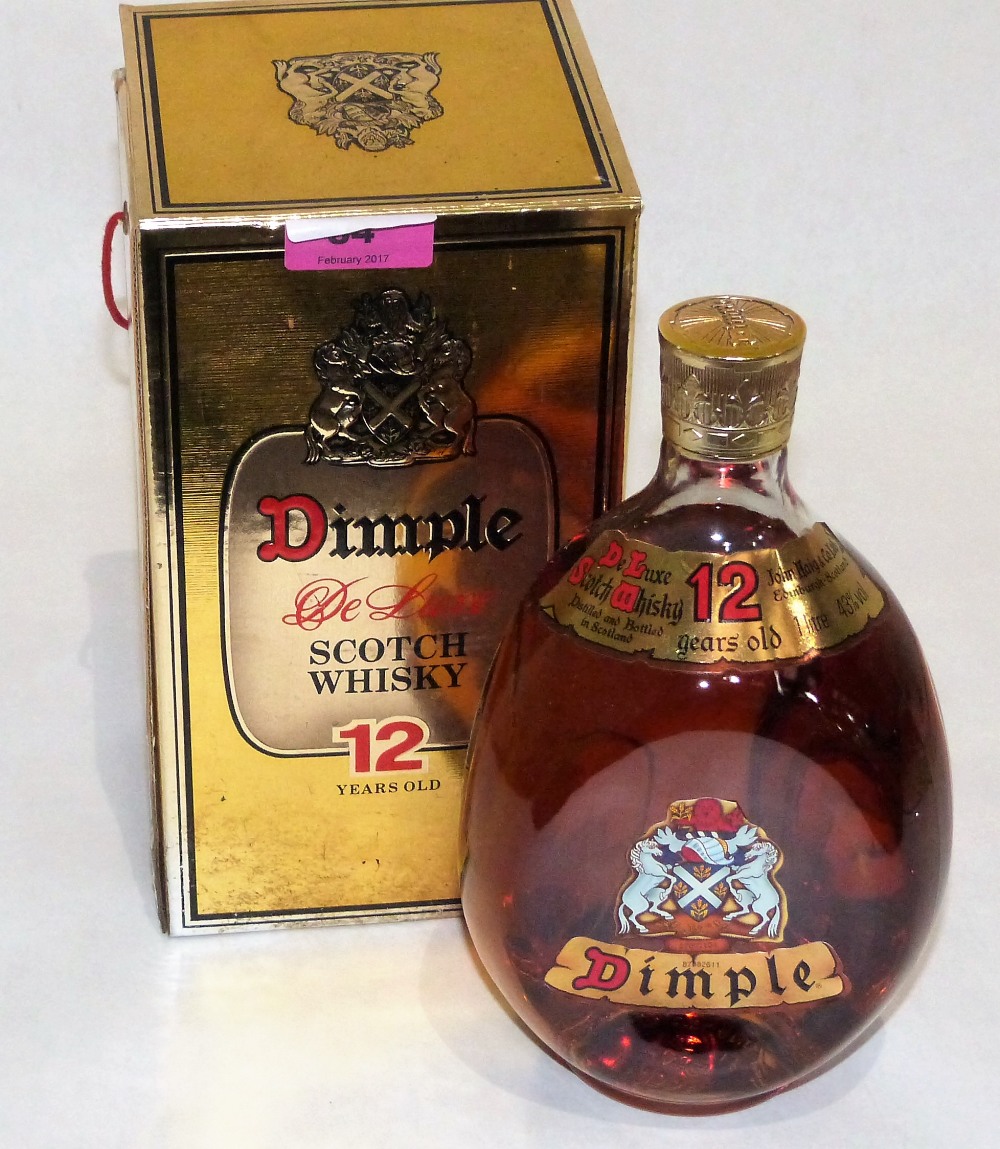A bottle of Dimple De-Luxe Scotch whisky. 12 years old, retaining ...