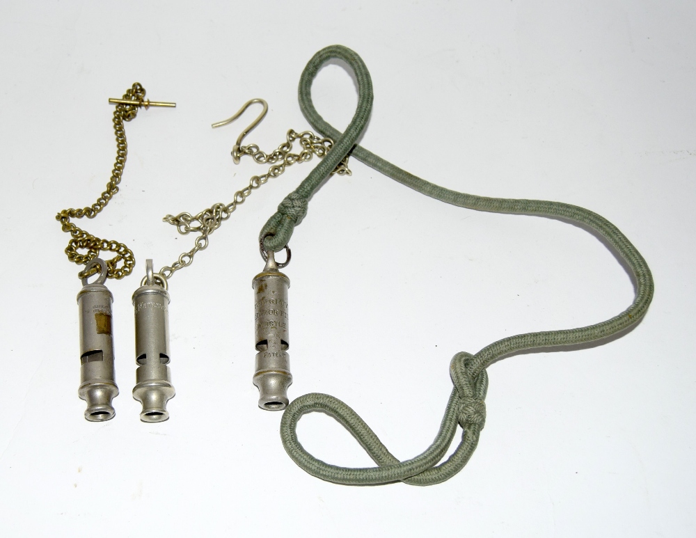 Two Police whistles on chains and a City Police or Fire whistle on a ...