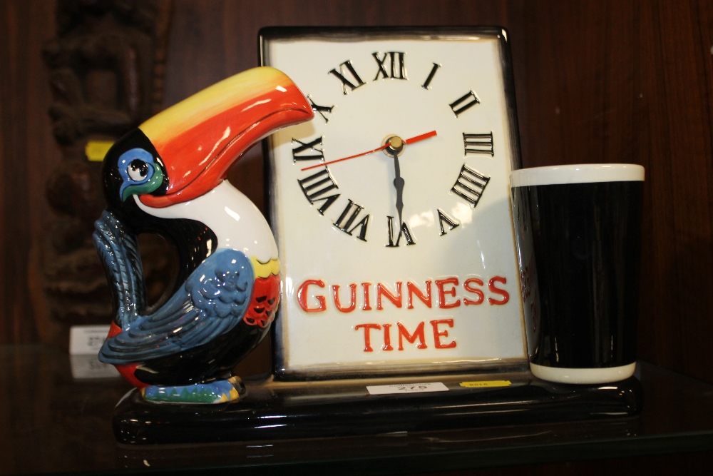 A CERAMIC GUINNESS TIME PELICAN CLOCK