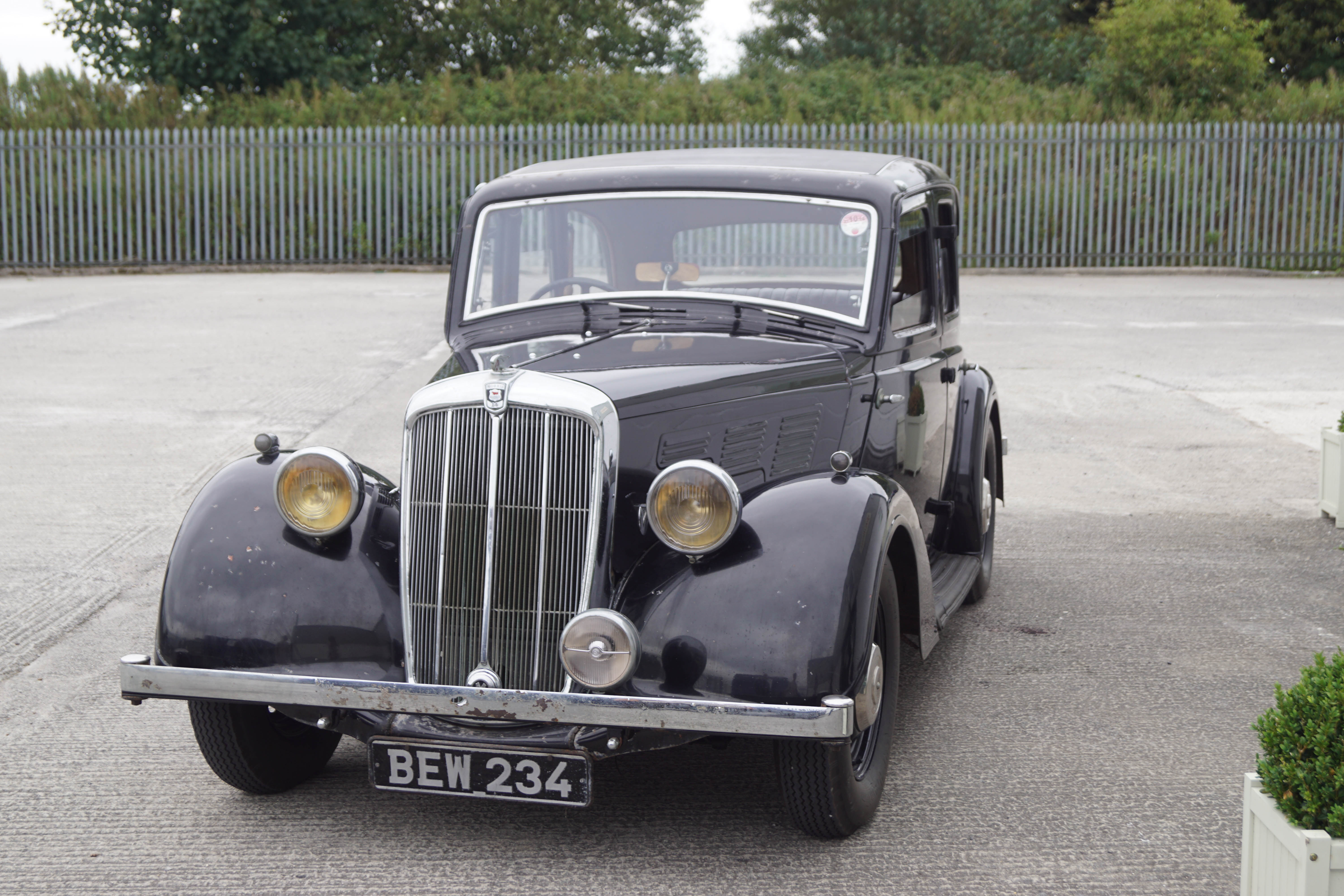 A Series III 1938 Morris 14/6 saloon with sunroof. The car bears its ...