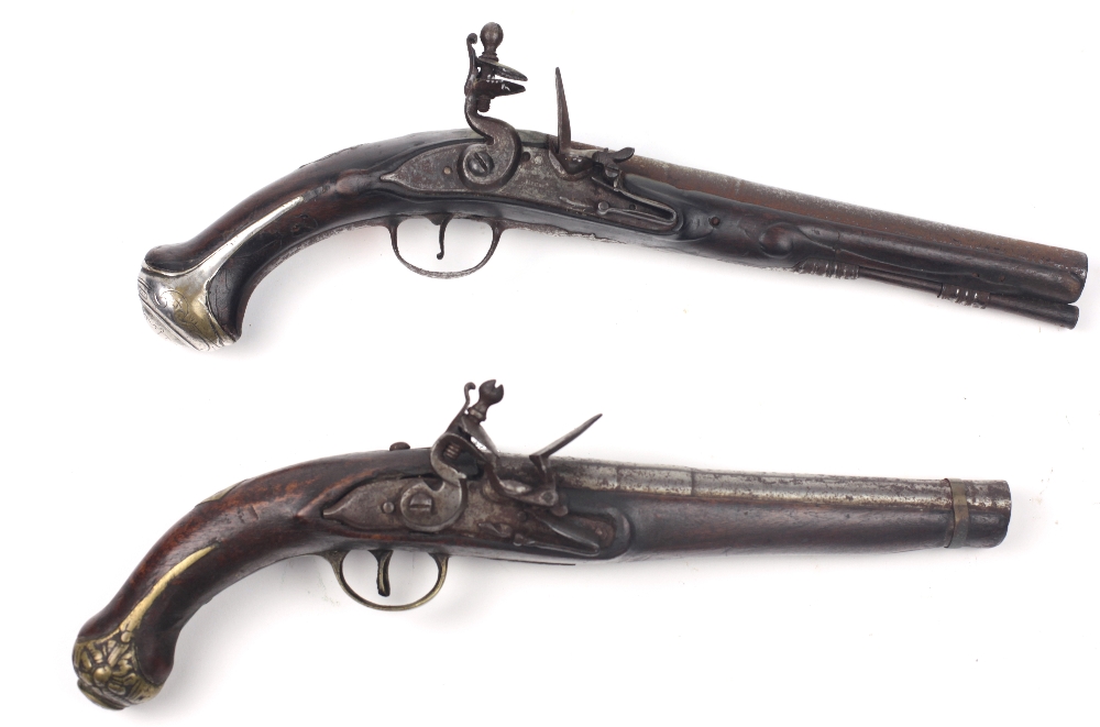An 18th Century Flintlock Dueling Pistol, the circular barrel with ...