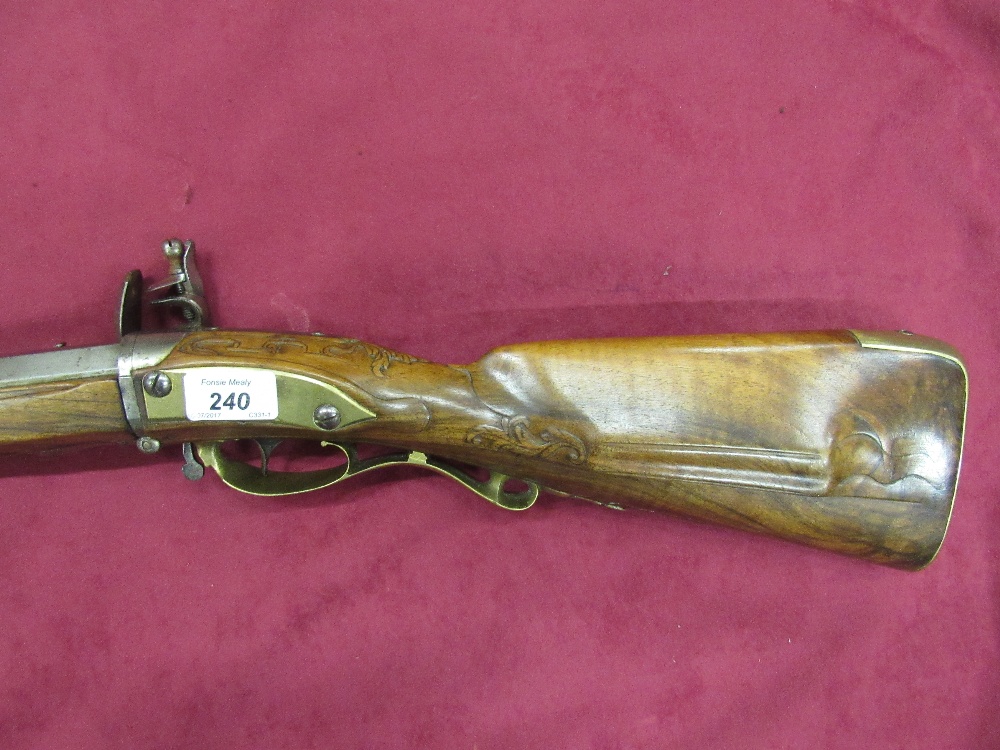 A very good large German breech-loading flintlock Musket, with carved ...
