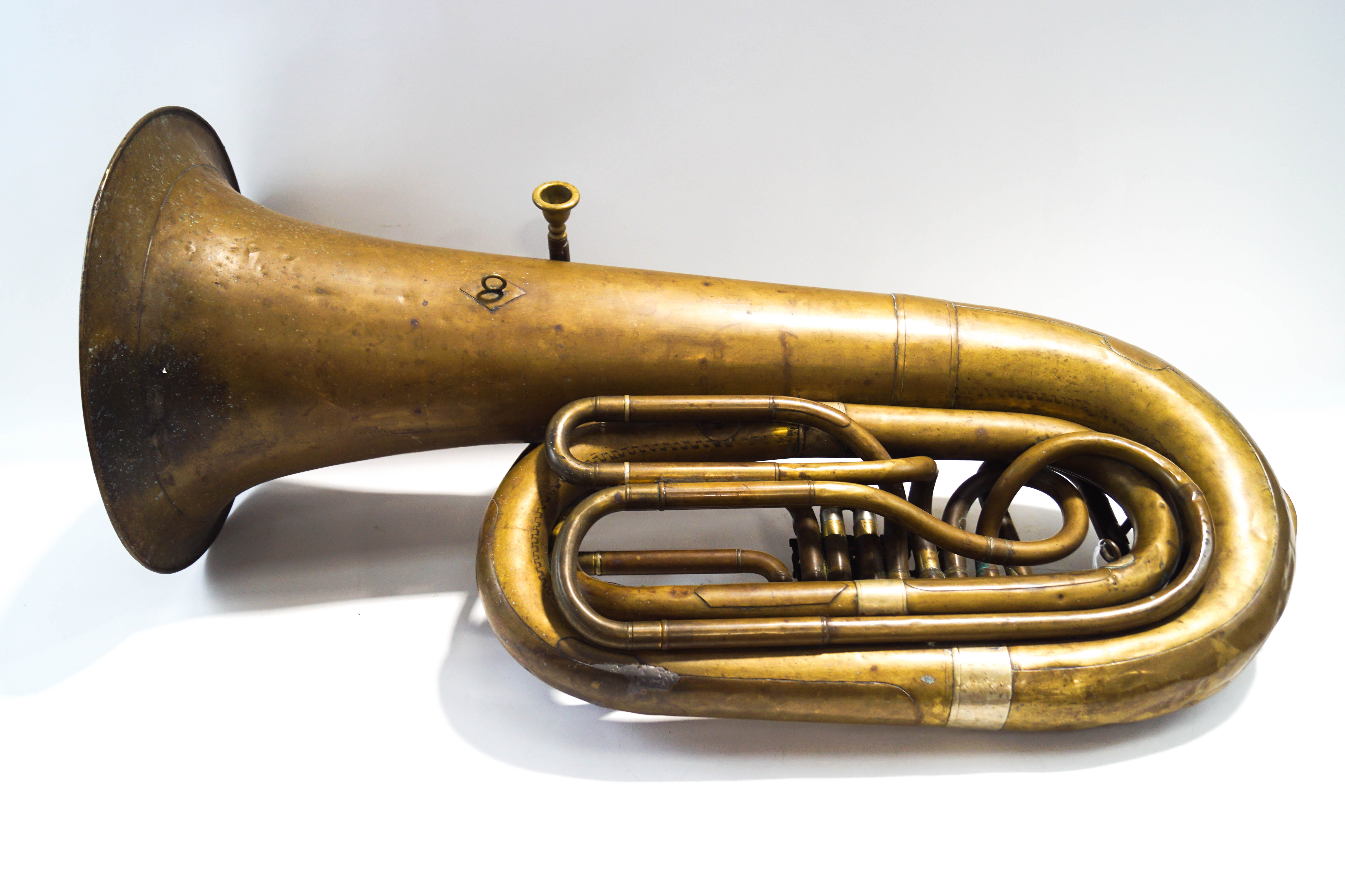 A late 19th century brass Bombardon Bb flat Tuba, European manufacturer