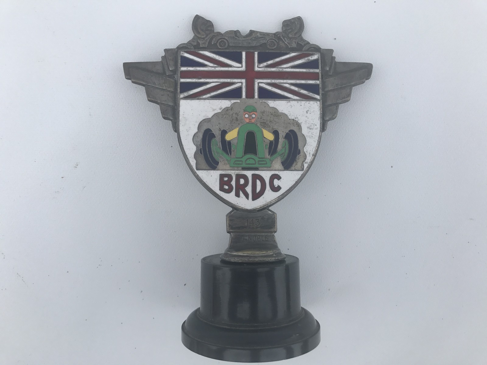 A BRDC Racing Drivers' Club badge inscribed G. Noble 143, with the S.C ...