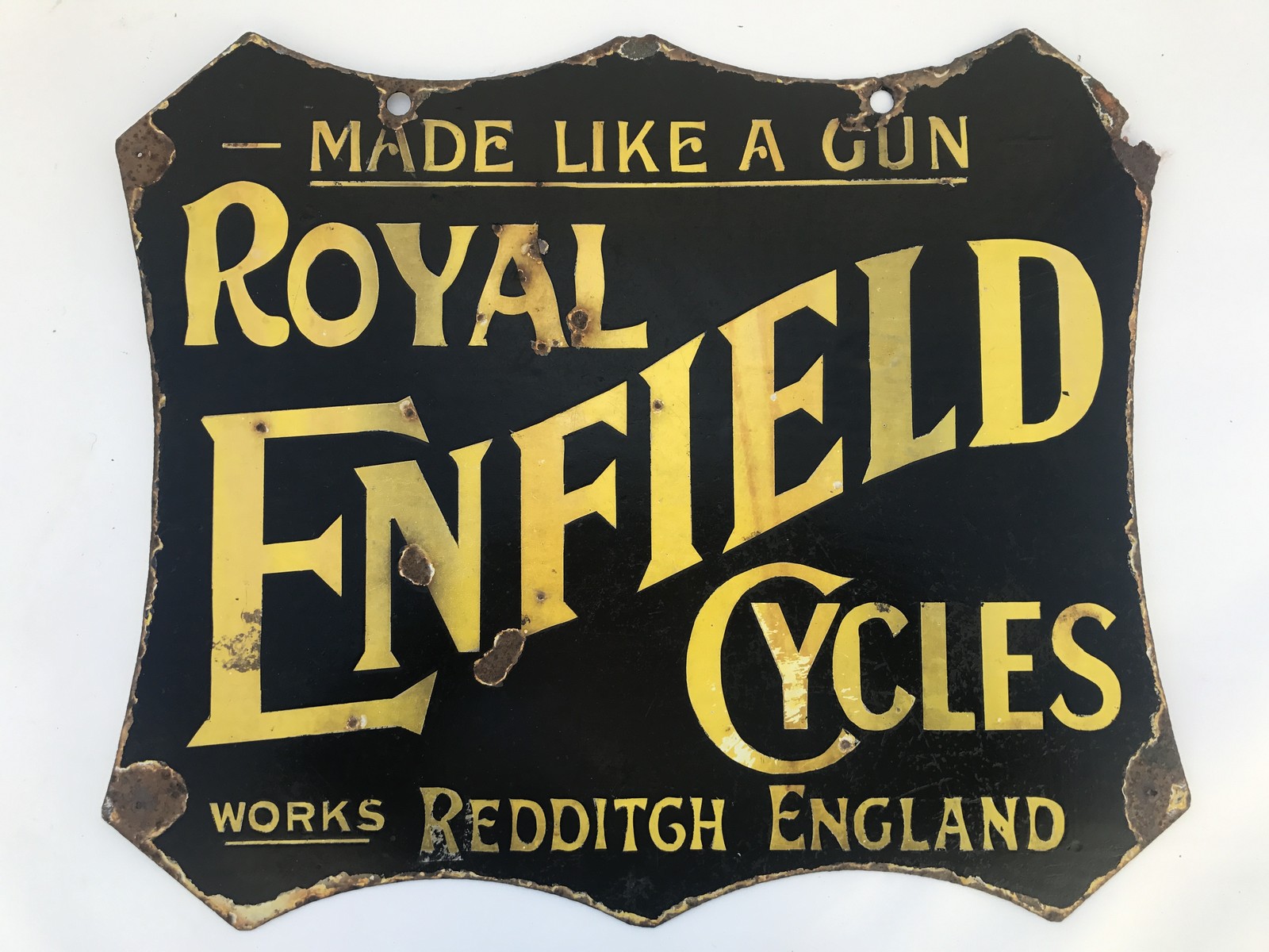 A rare and early Royal Enfield Cycles shaped double sided enamel sign ...