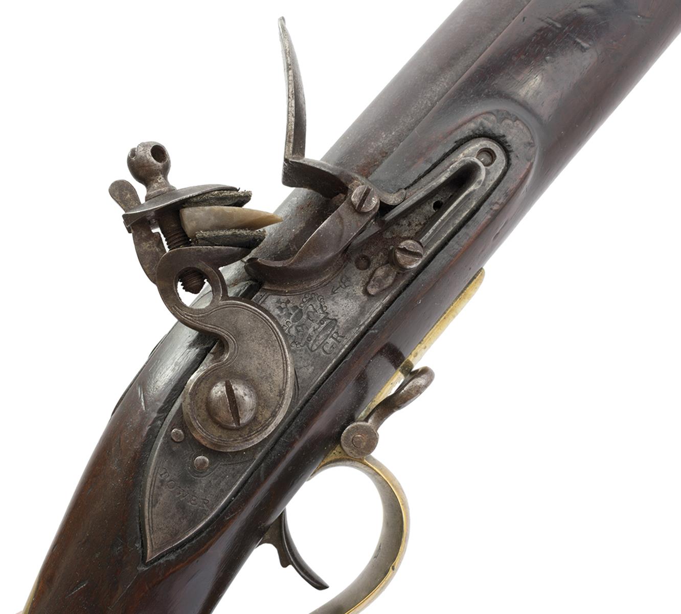 An 18-bore flintlock Baker Rifle, 30.5inch sighted barrel, the tang ...
