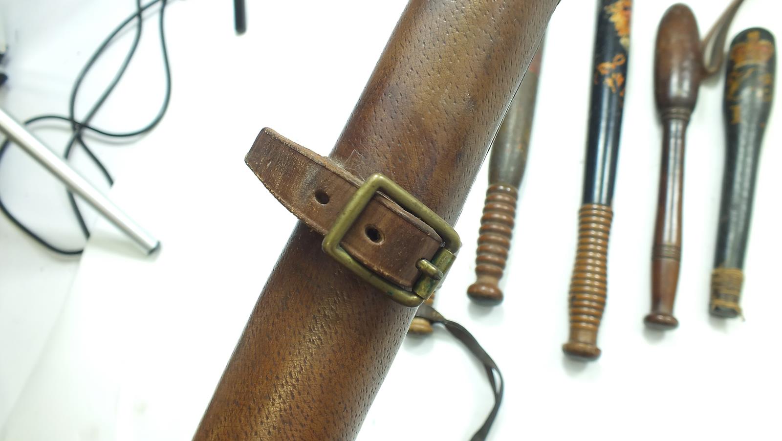 Eight various truncheons, to include painted examples and modern police ...
