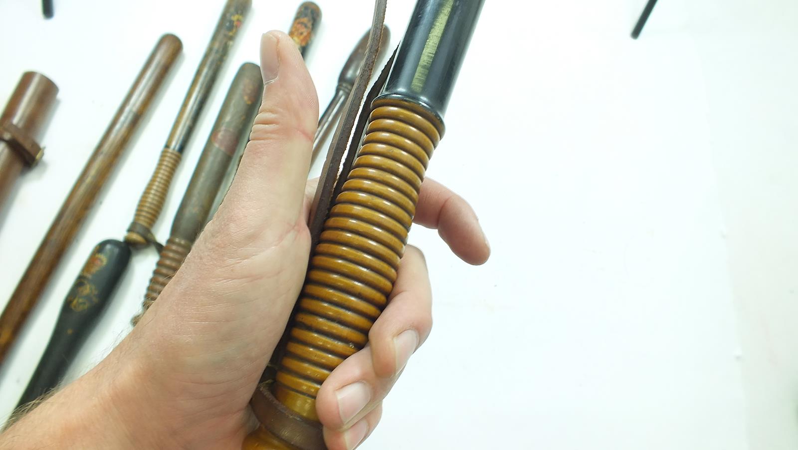 Eight various truncheons, to include painted examples and modern police ...