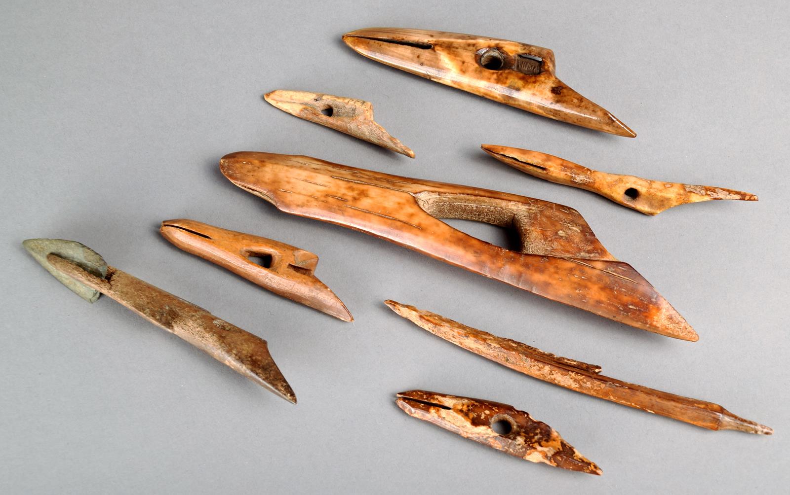 λ Eight Inuit harpoon heads Alaska walrus ivory and bone, one with an ...