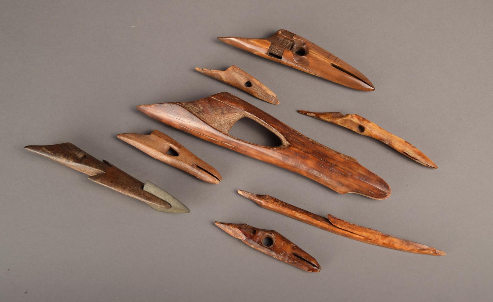 λ Eight Inuit harpoon heads Alaska walrus ivory and bone, one with an ...