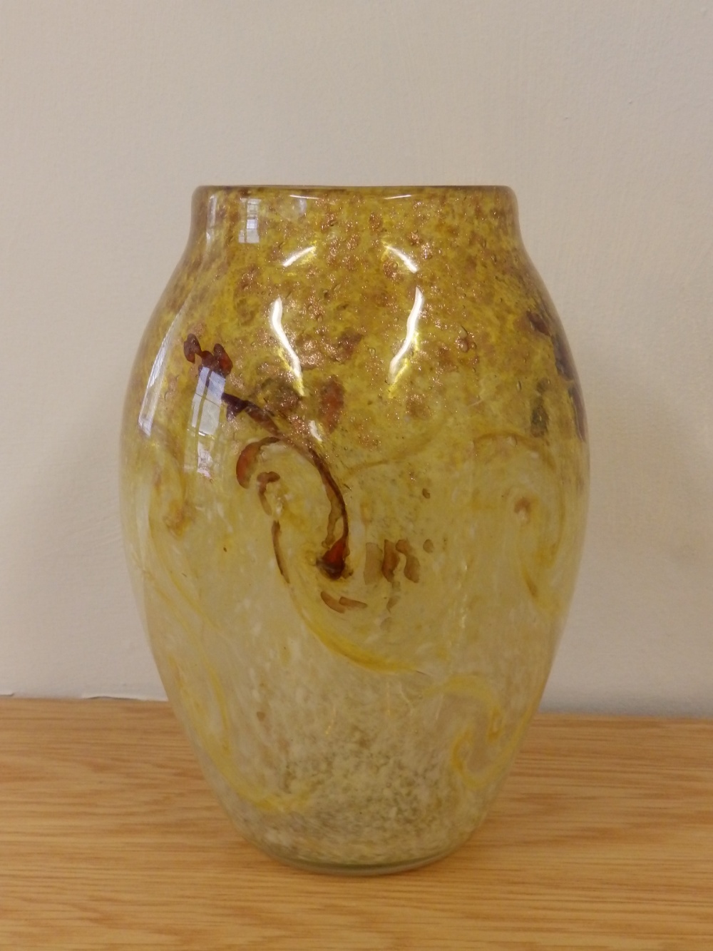 A Moncrieff Monart glass vase, 8” high.