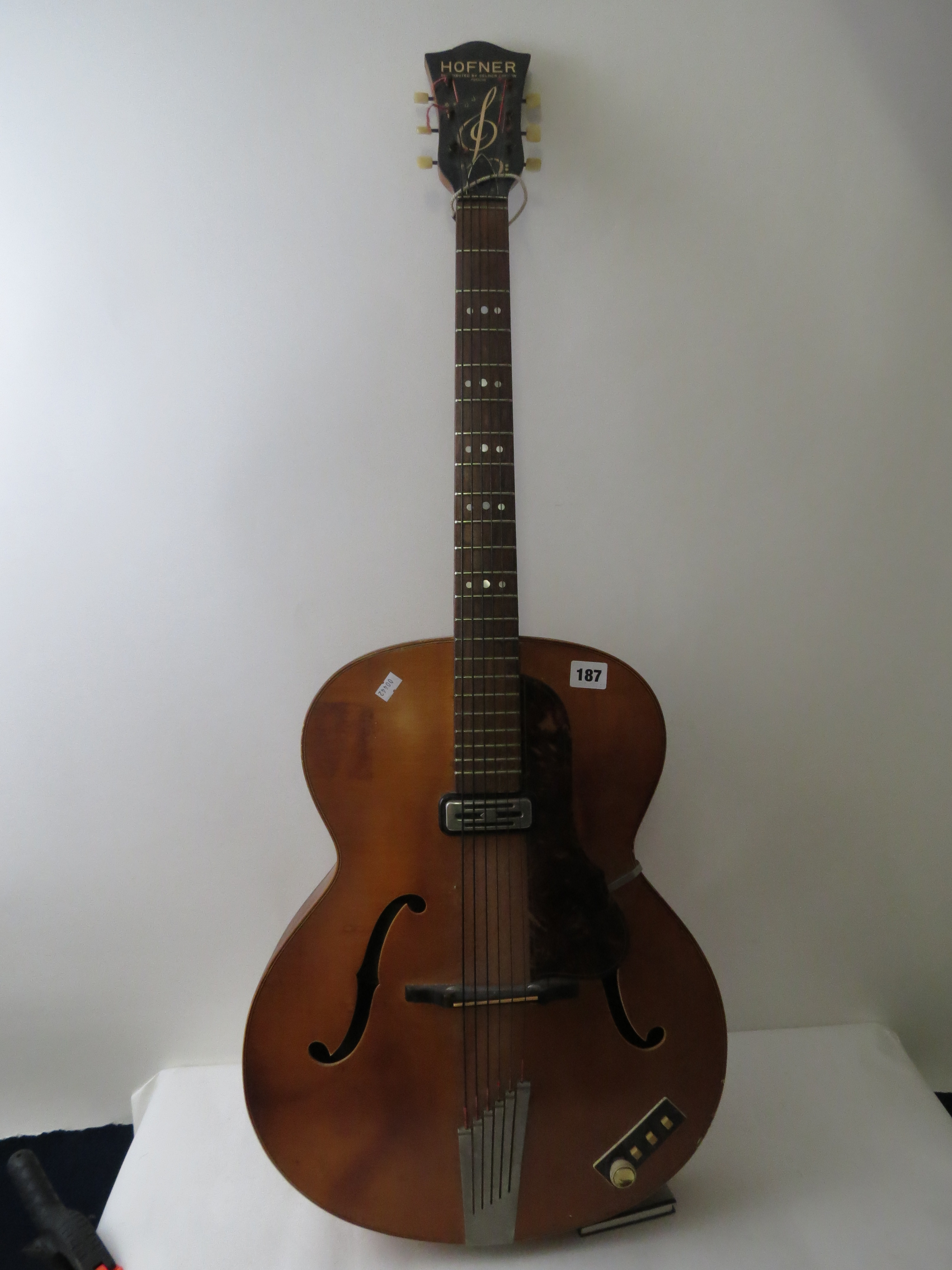 A Hofner Senator acoustic guitar, serial number 11105, circa 1950; and ...