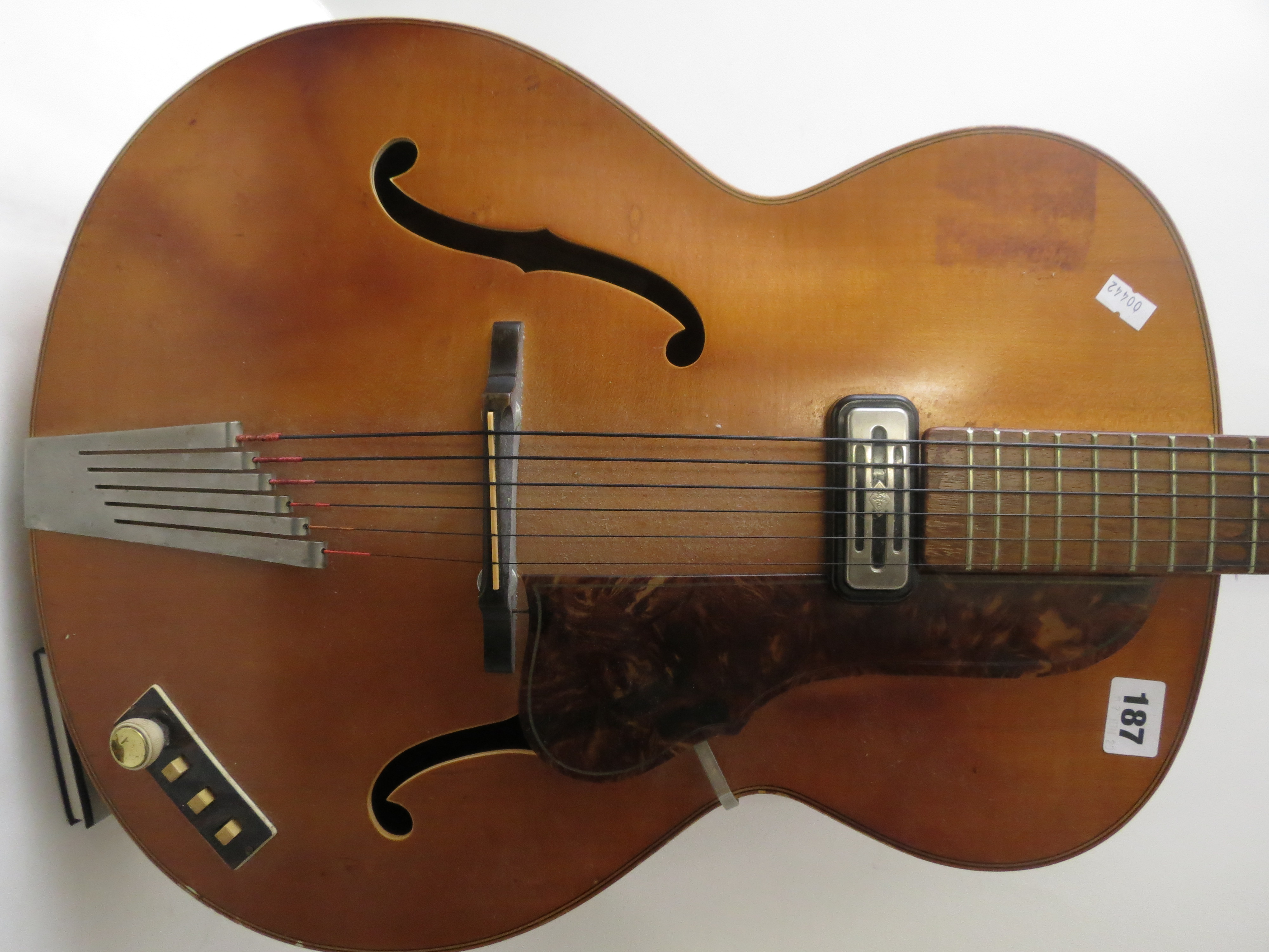A Hofner Senator acoustic guitar, serial number 11105, circa 1950; and ...