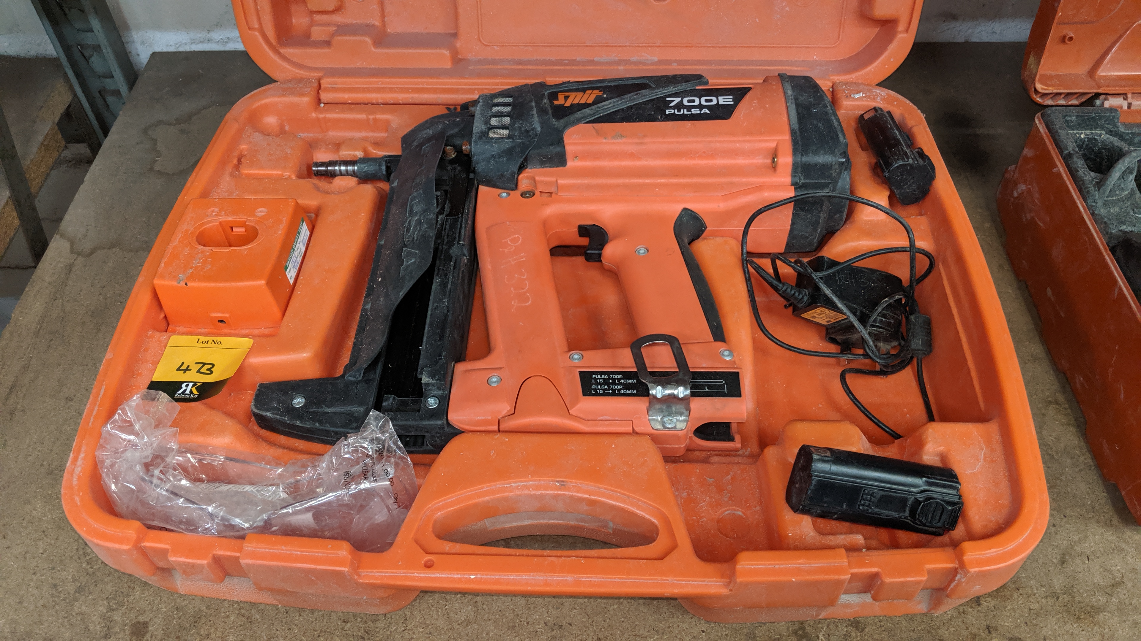 Spit Pulsa 700E nail gun including charger, case & 2 batteries ...