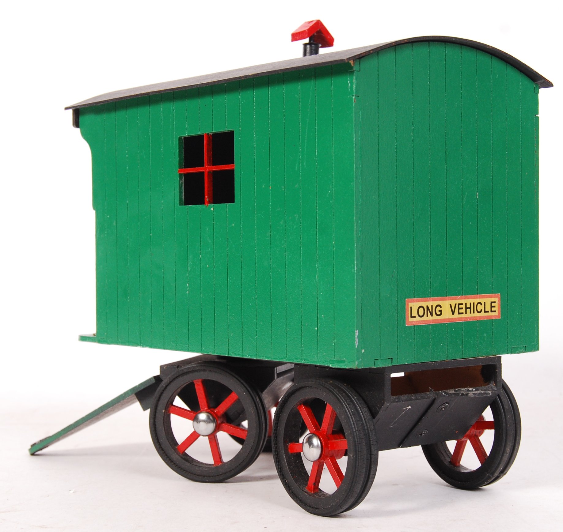 A live steam traction engine pull along wooden living van / wagon cabin ...