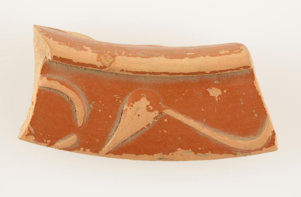 A ROMAN SAMIAN WARE POTTERY FRAGMENT, decorated and engraved "SIMA", c ...