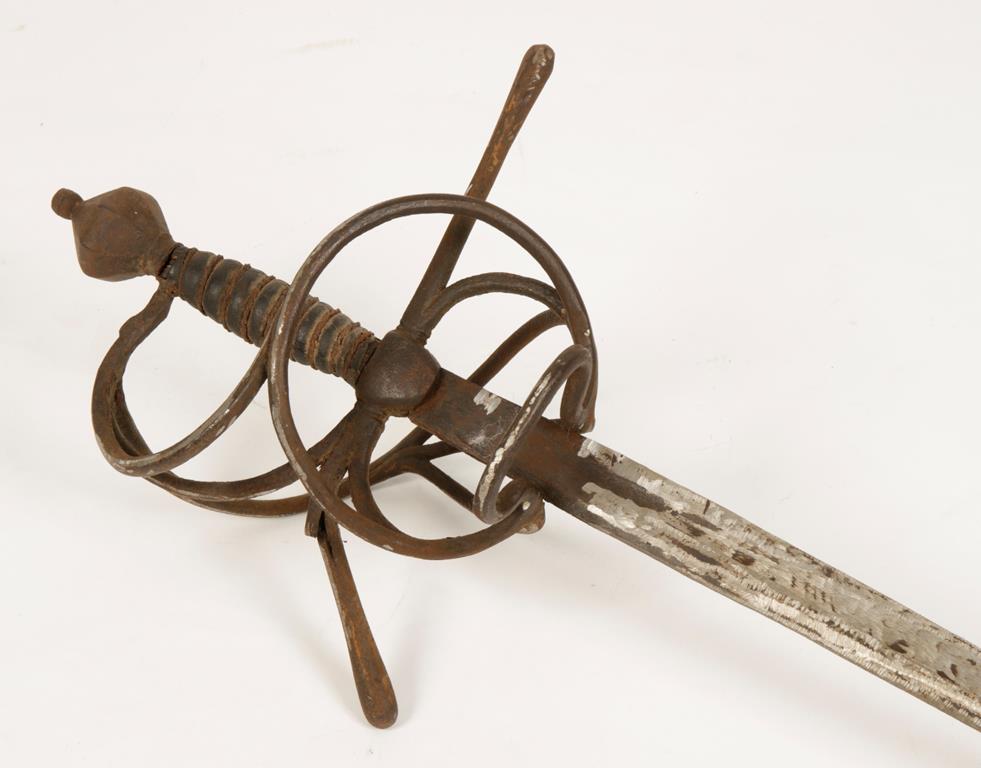 A EUROPEAN RAPIER, the hilt and guard formed of open scrolls and ...