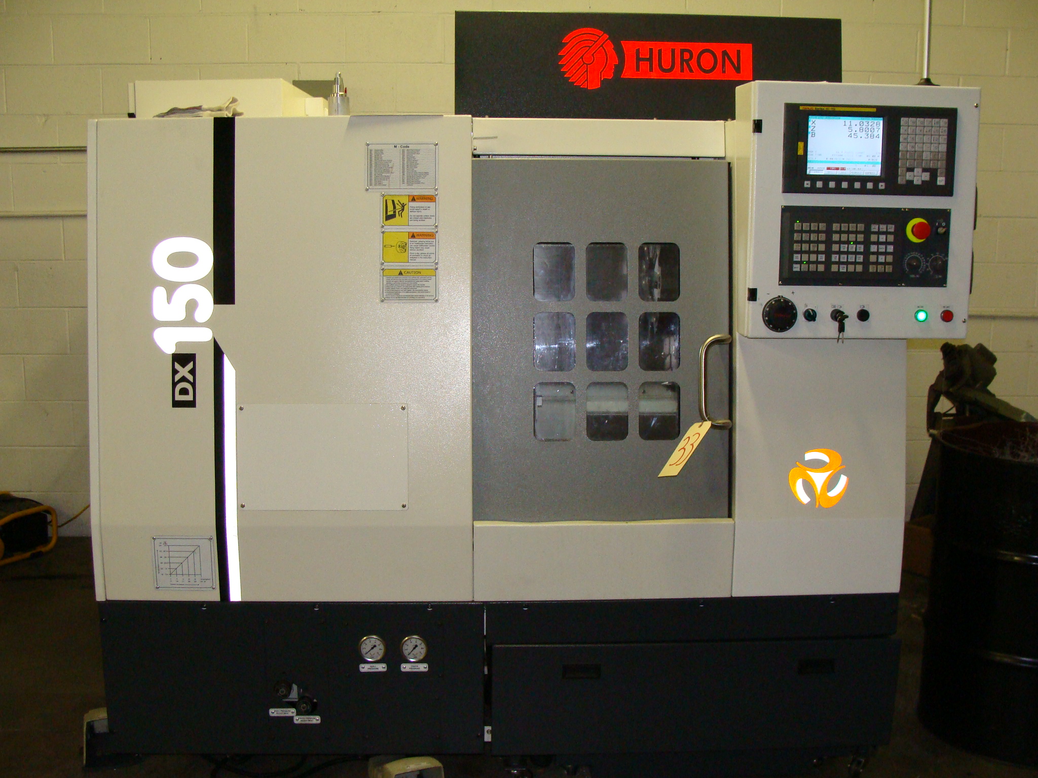 DX150 CNC Turning Center: FANUC Series Oi-MD Controller. Model: DX-150 ...