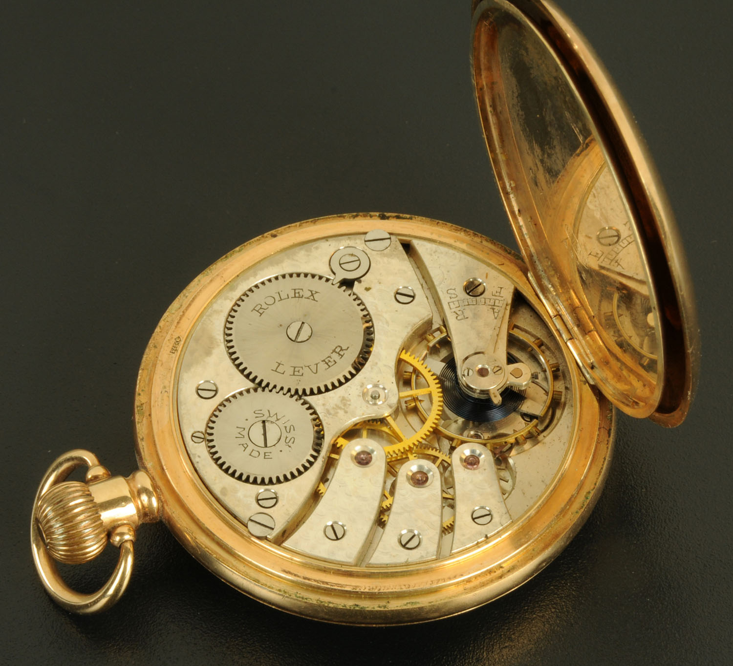 A Rolex 9 ct gold cased half Hunter pocket watch, knob wind (see ...