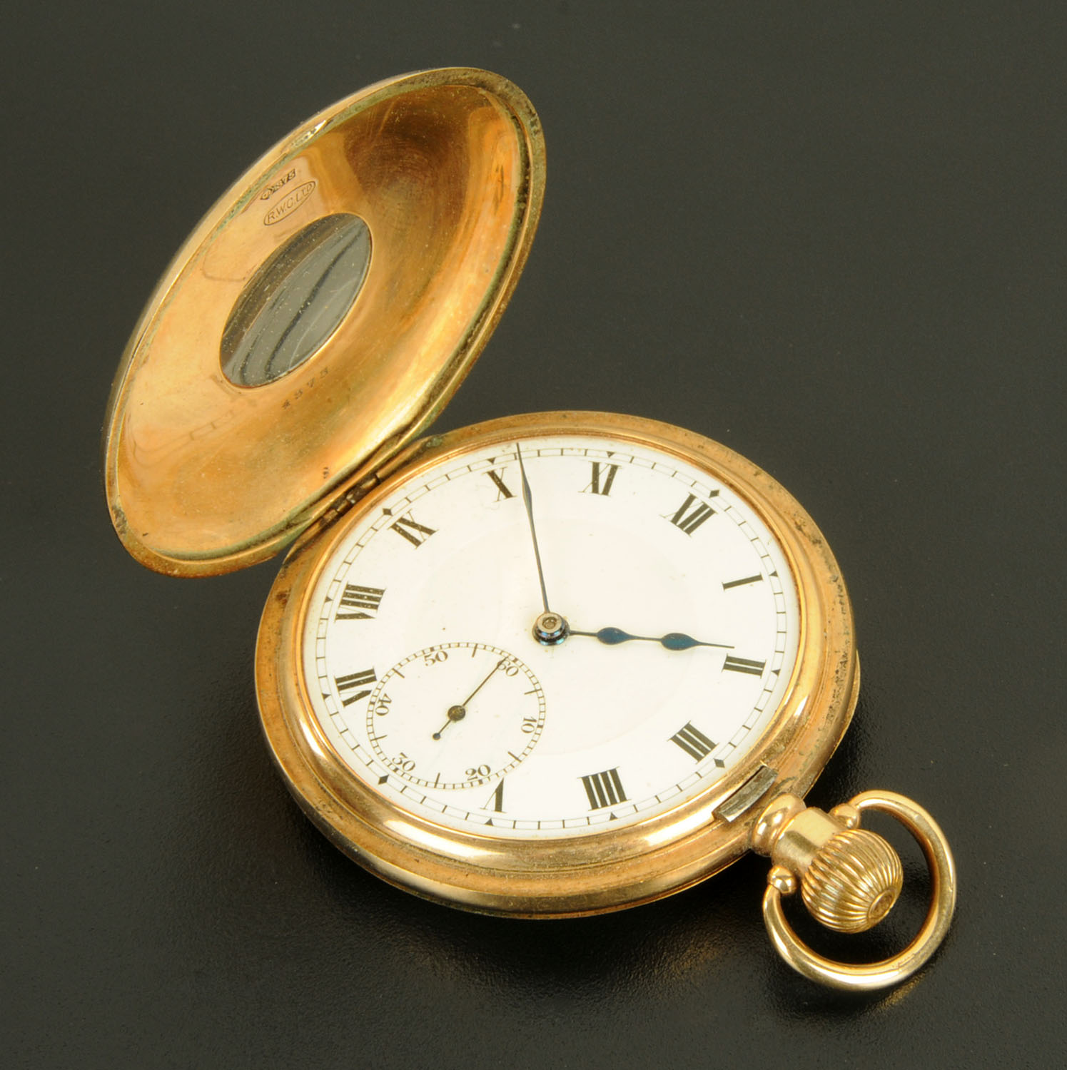 A Rolex 9 ct gold cased half Hunter pocket watch, knob wind (see ...