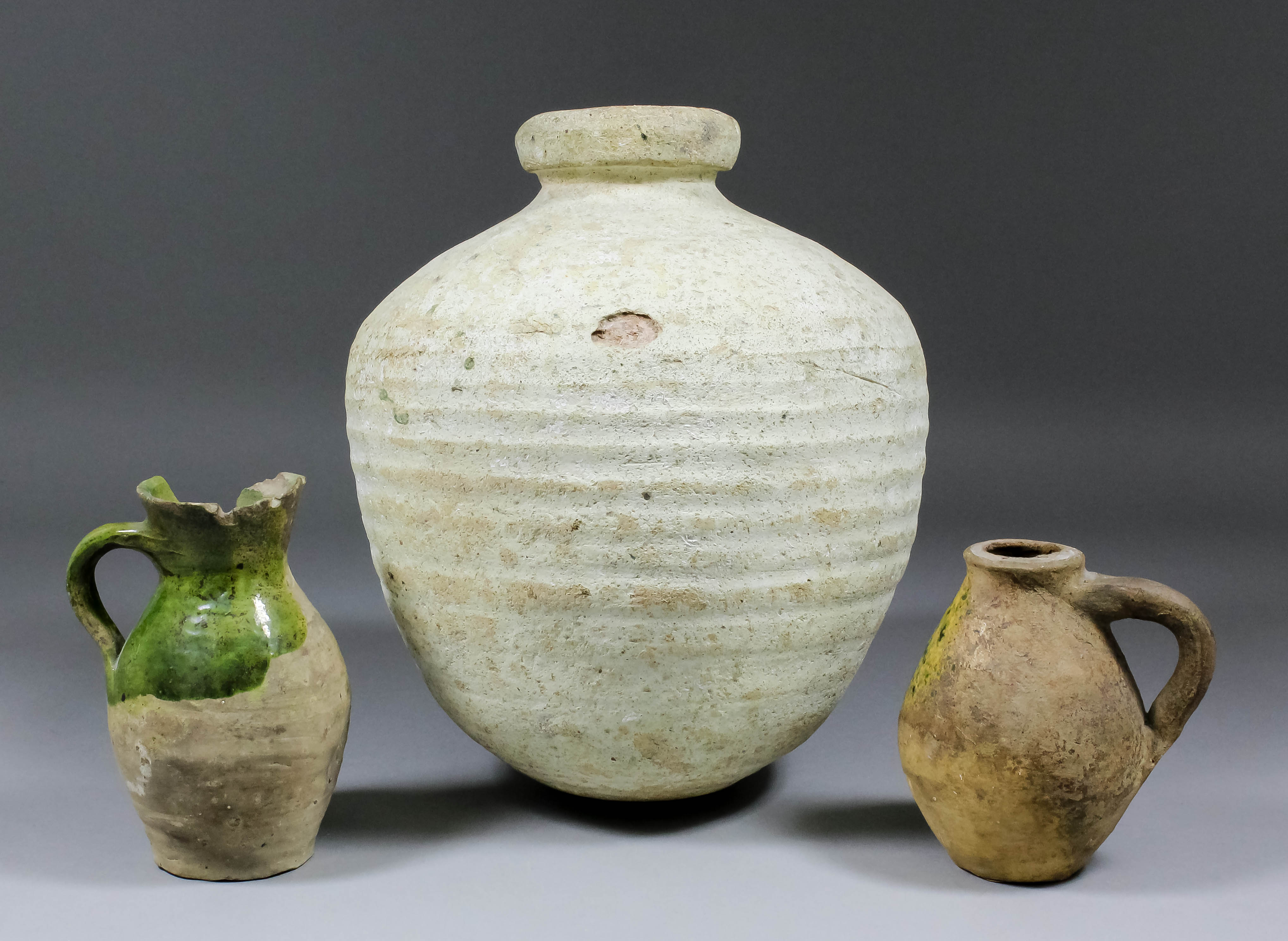 A Surrey "Border Ware" or "Tudor Green Glazed" pottery jug (16th or ...