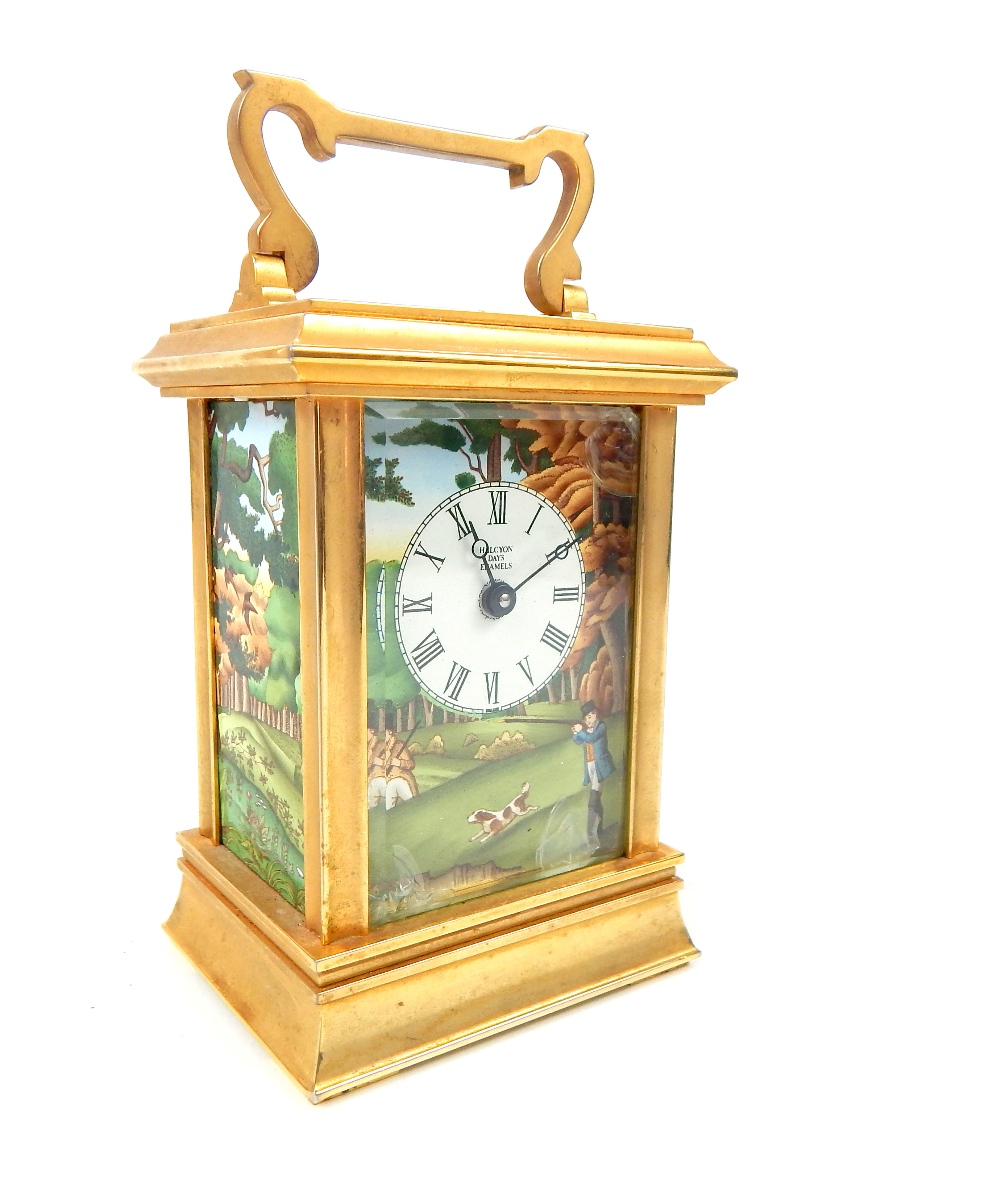 A Halcyon Days Enamel and brass carriage clock, the enamelled dial with ...