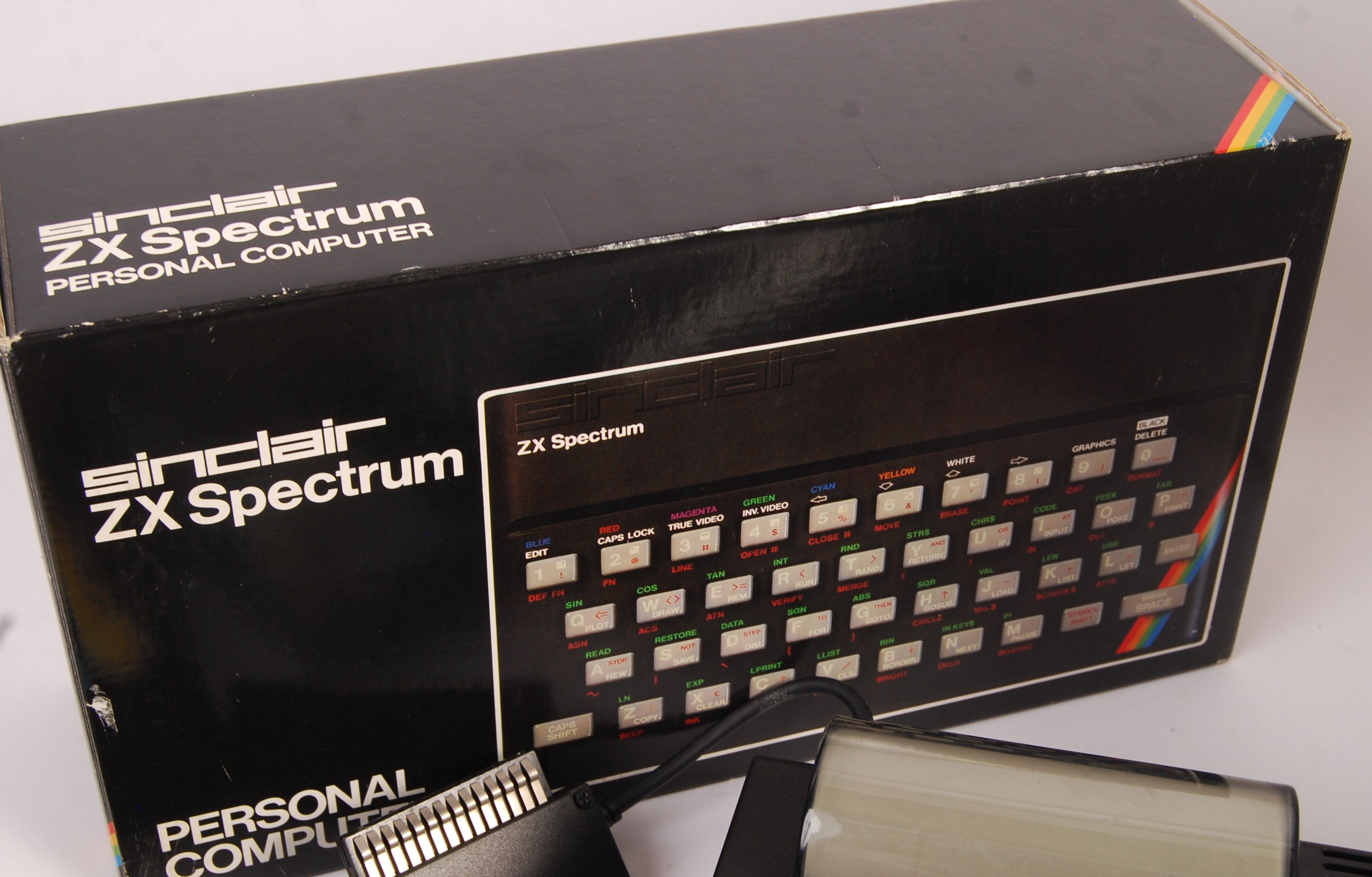 An original vintage Sinclair ZX Spectrum video games computer console along with Timex printer fo