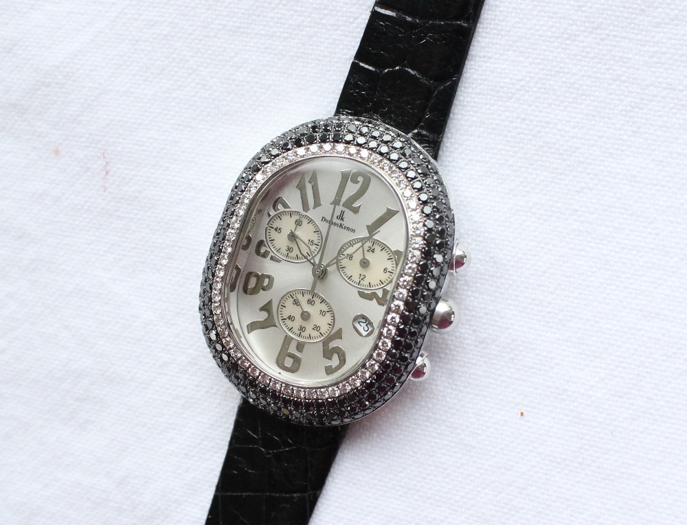 A Lady's Domoskenos wristwatch, the oval dial with Arabic numerals, and ...