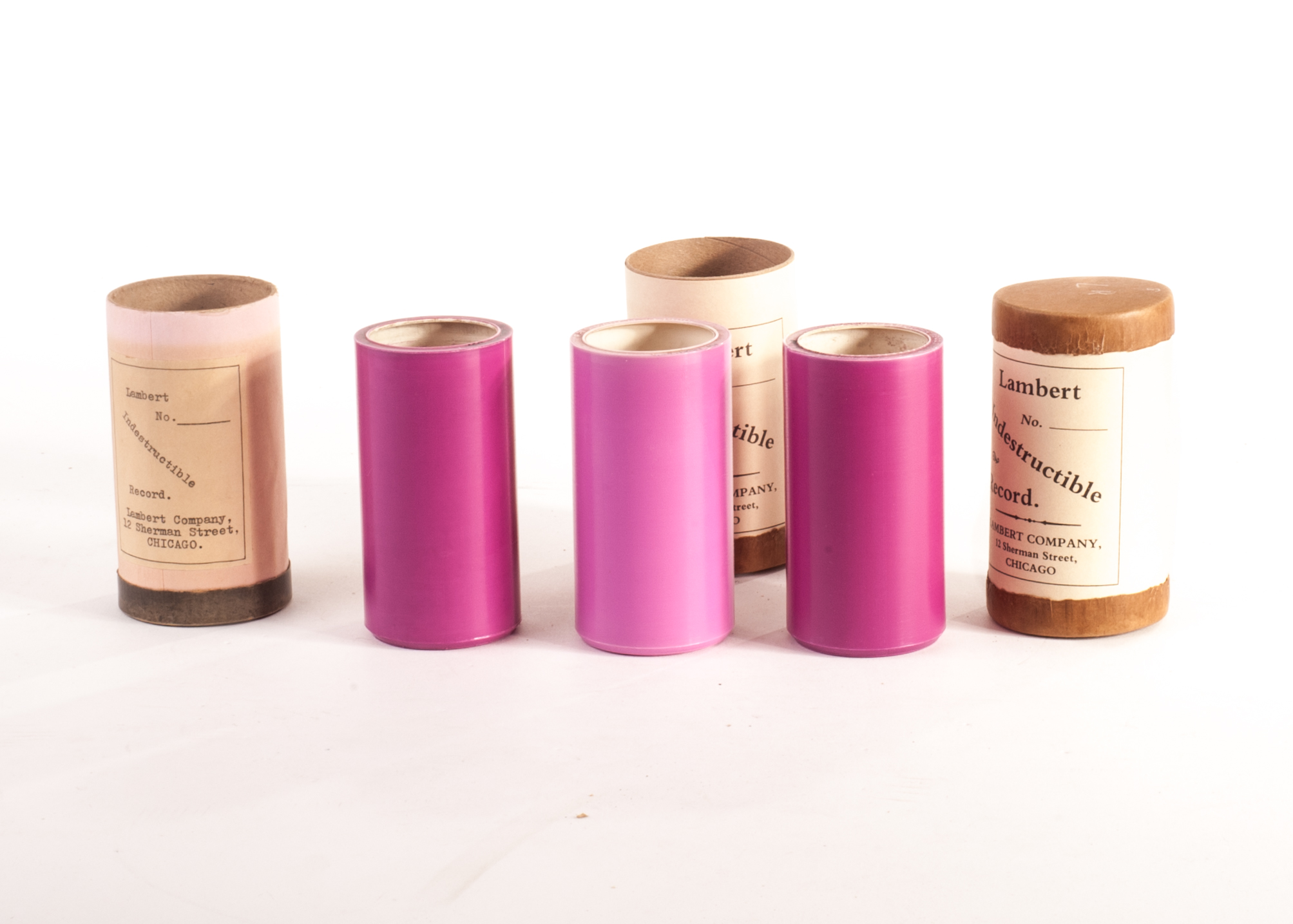 Phonograph cylinders: three pink Lambert cylinders, 701, 967, 938, in ...