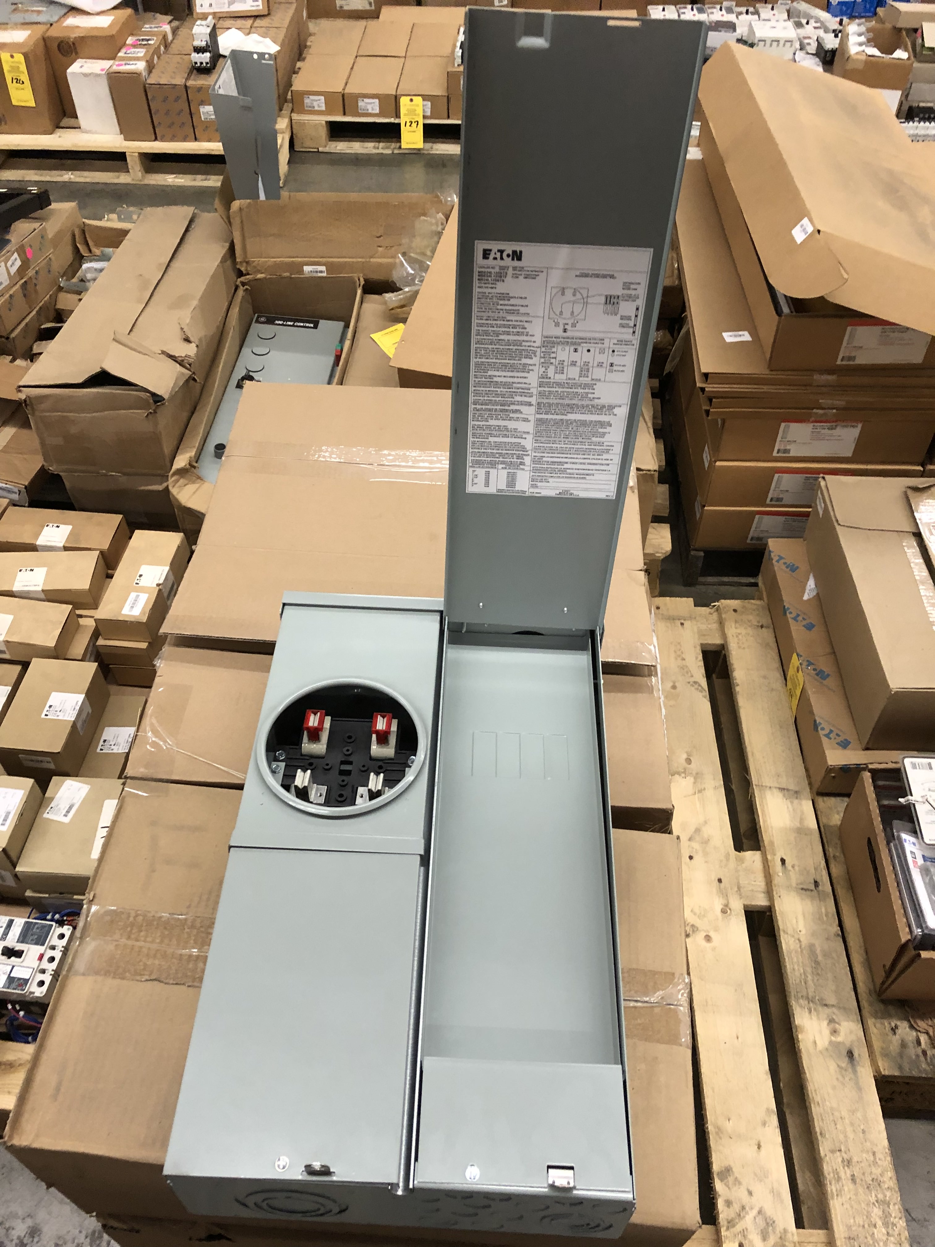 PALLET OF (9) EATON 125A OUTDOOR METER BREAKERS; 4 SPACES & 6 CIRCUITS