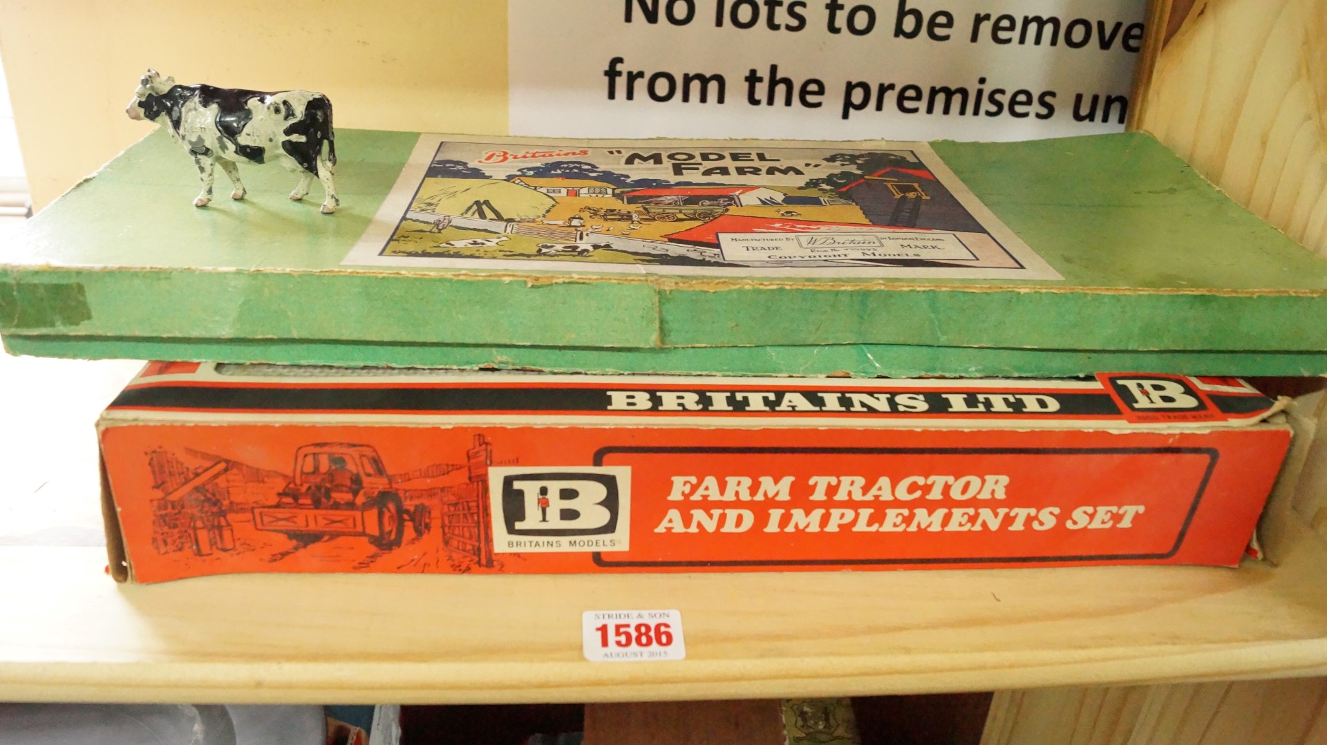 A Britains model farm part set, boxed; together with a Britains farm ...