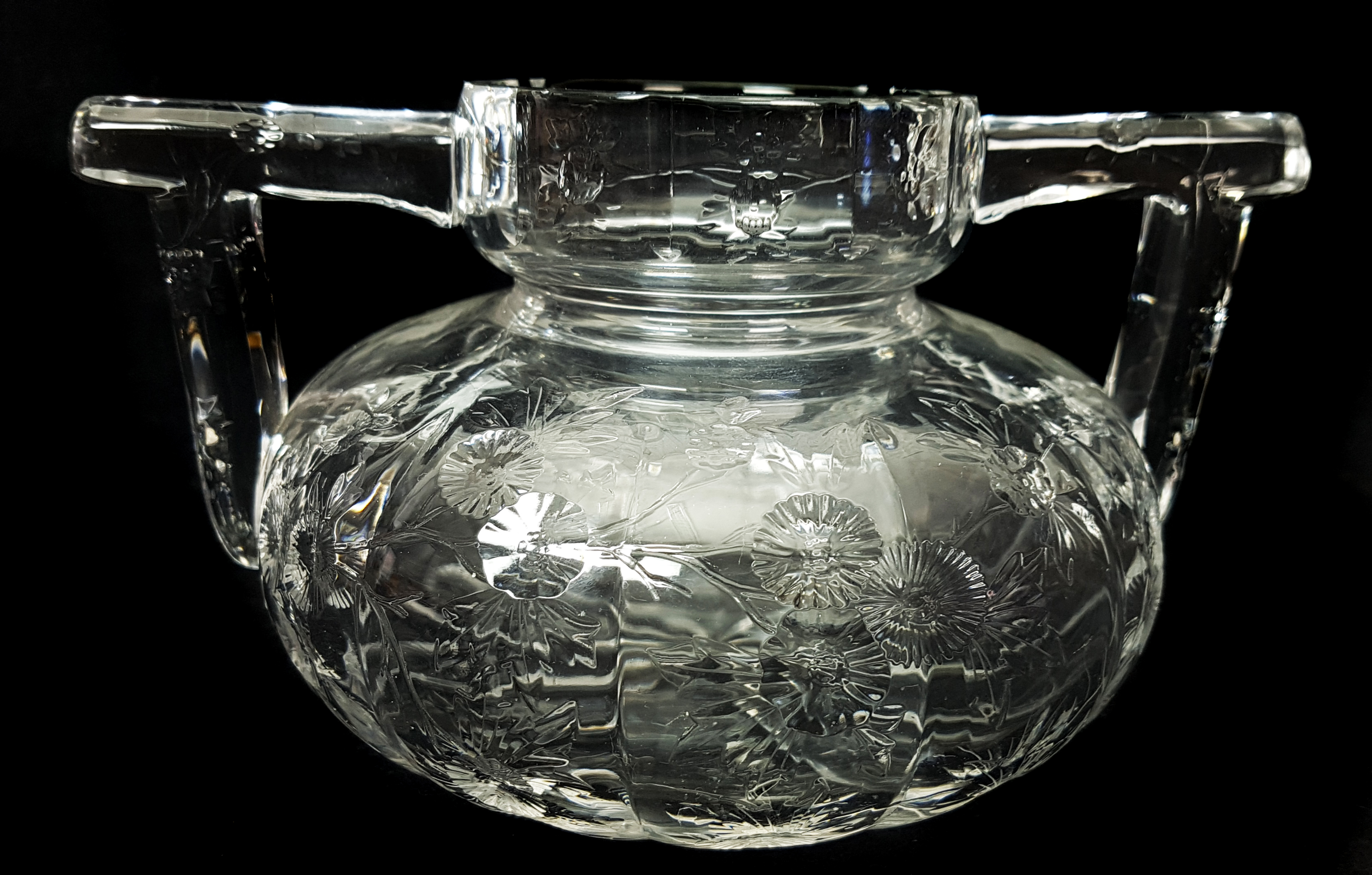 Stevens & Williams - An intaglio cut two handled 'rock crystal' glass ...