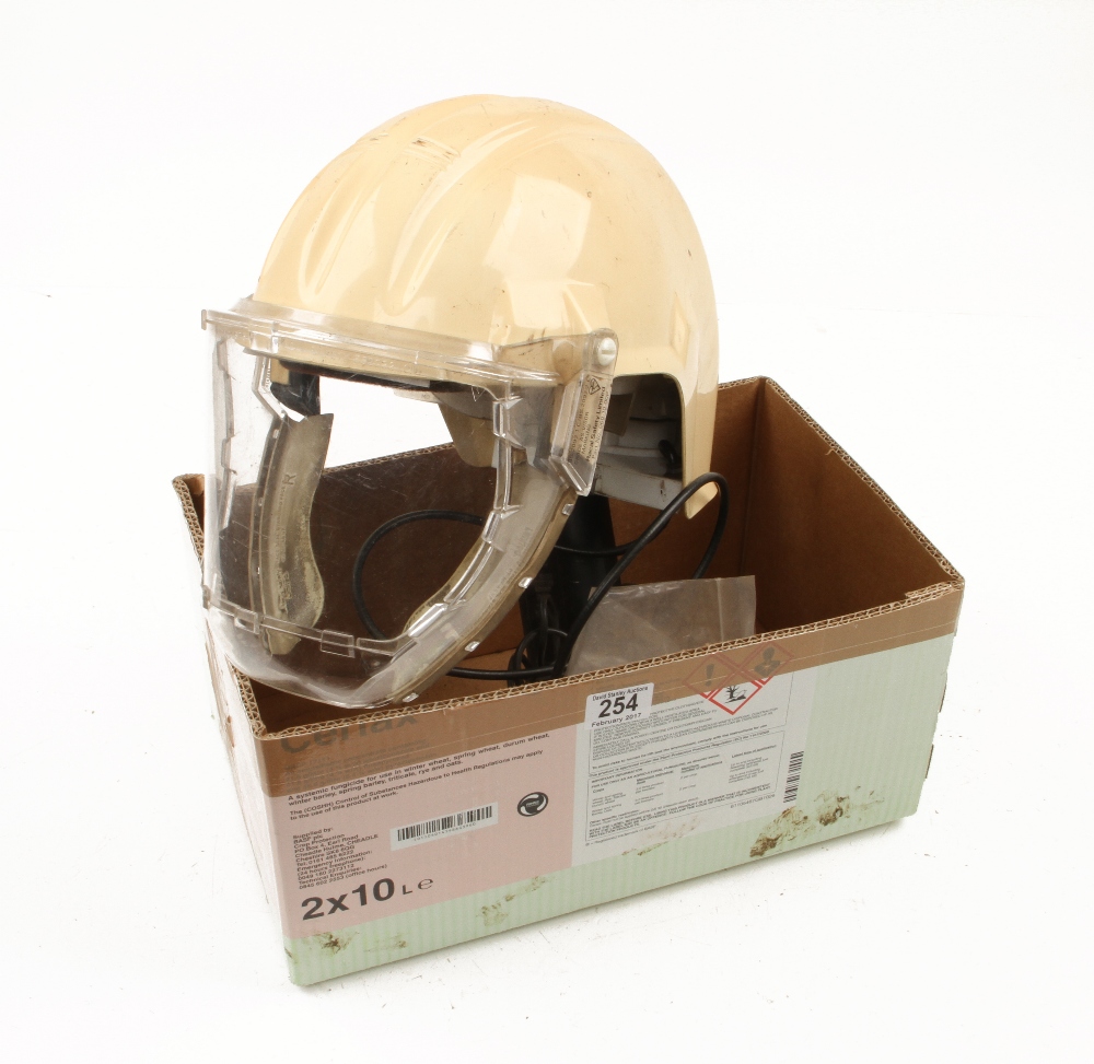 A RACAL airstream helmet with filters, battery and charger