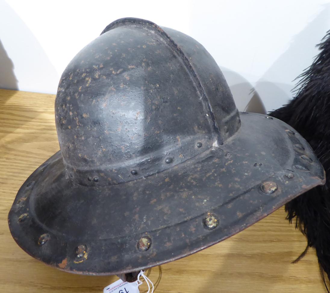 An English Civil War Pikeman's Helmet, the two piece skull with folded ...