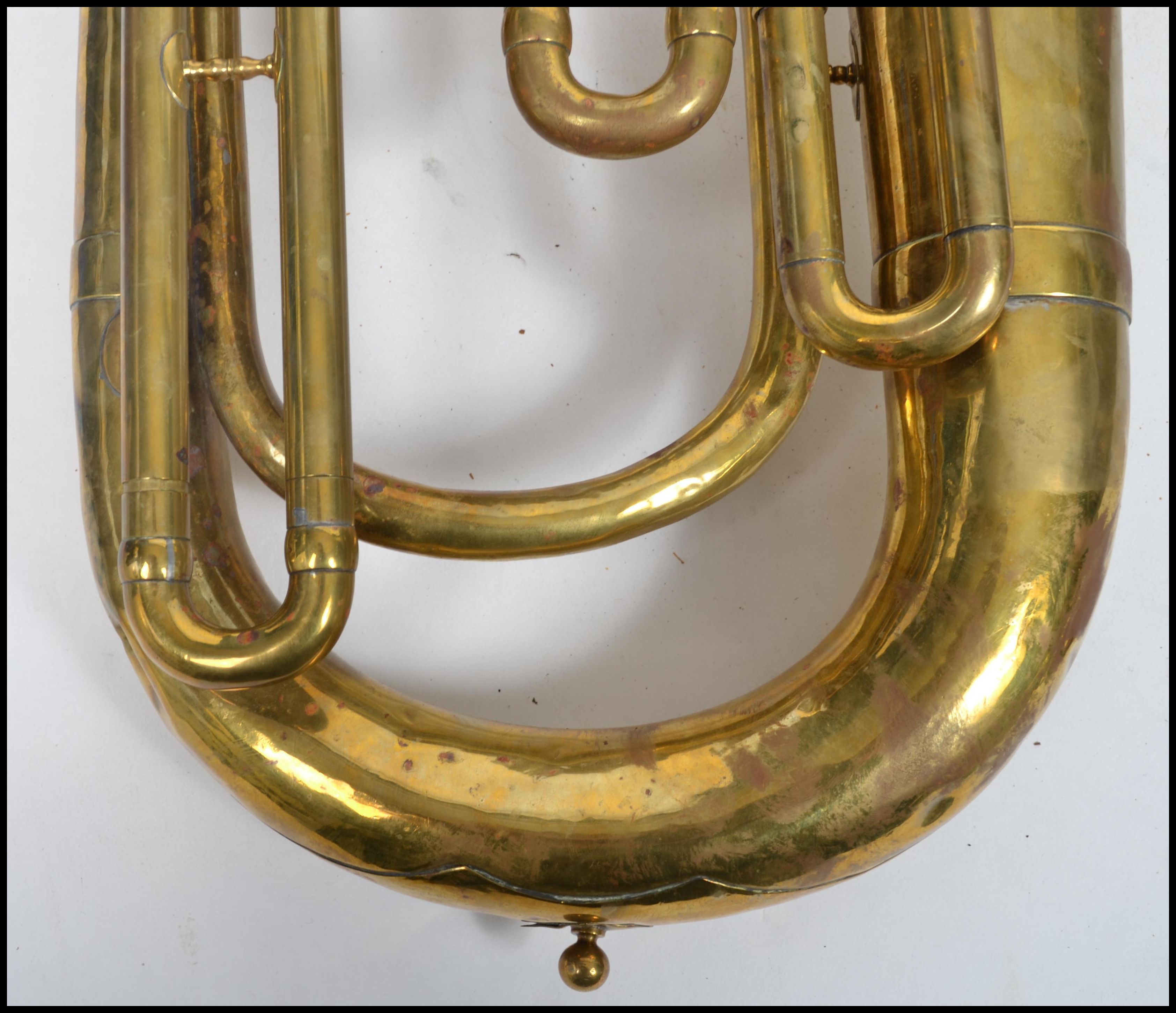 A vintage 20th century brass tuba musical instrument by A Hall Gisborne ...