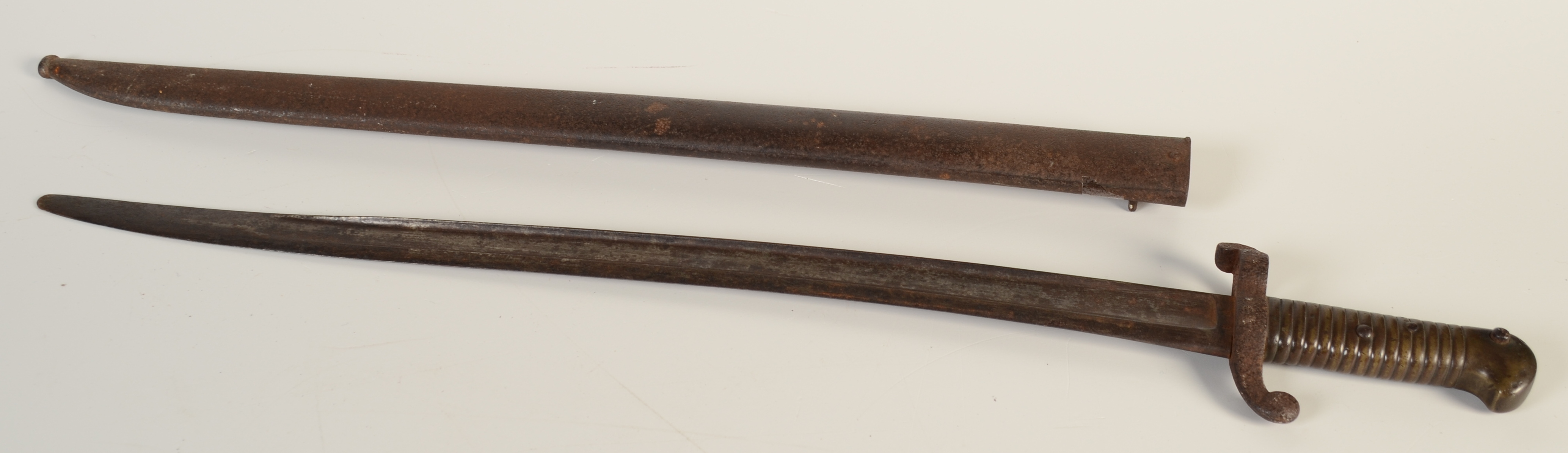 A Franco Prussian war bayonet, with a brass grip, length including ...