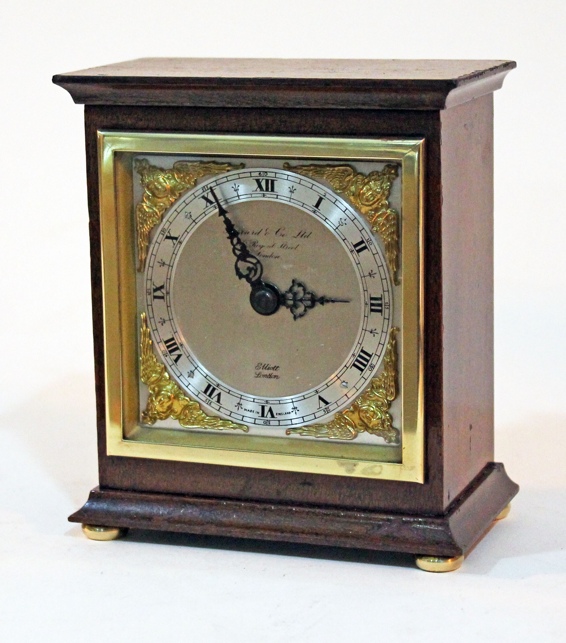 A 20th Century Elliott mahogany cased mantel clock, retailed by Garrard ...